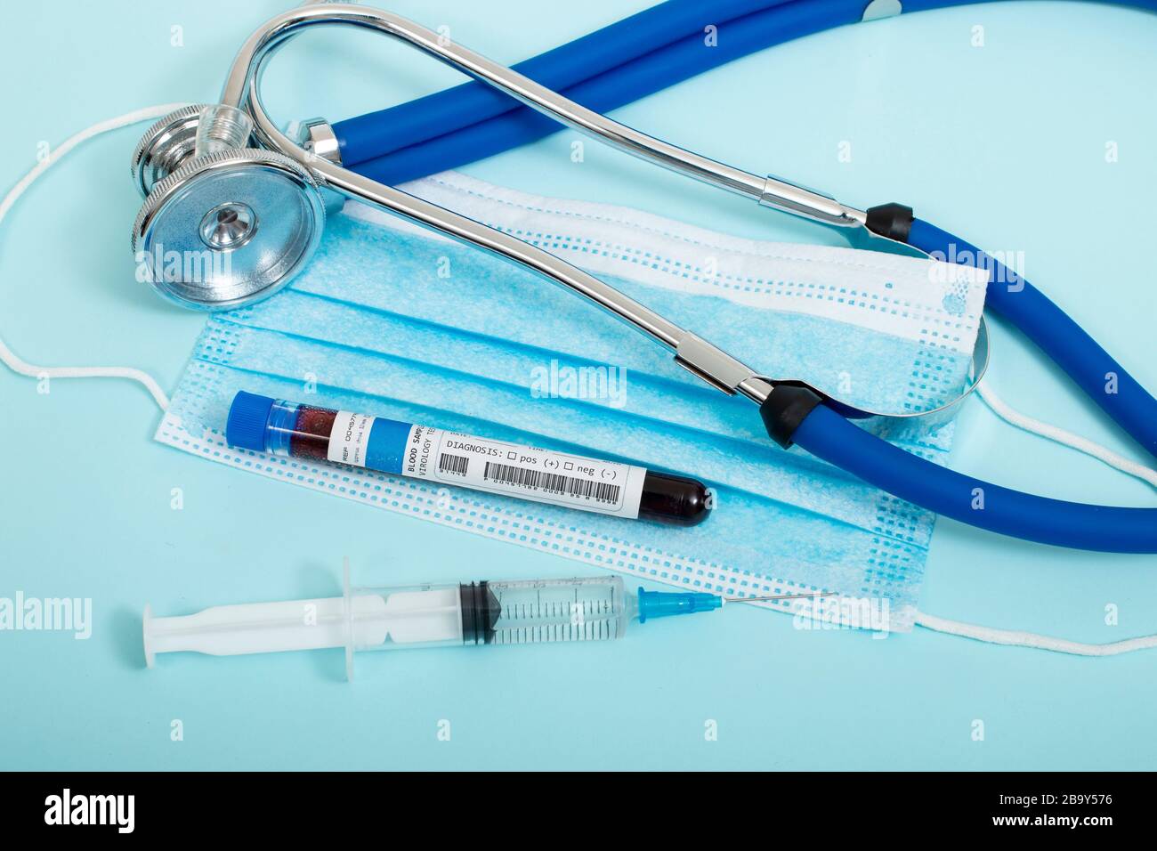 Fictional Blood samples with infected virus, with stethoscope, mask and ...