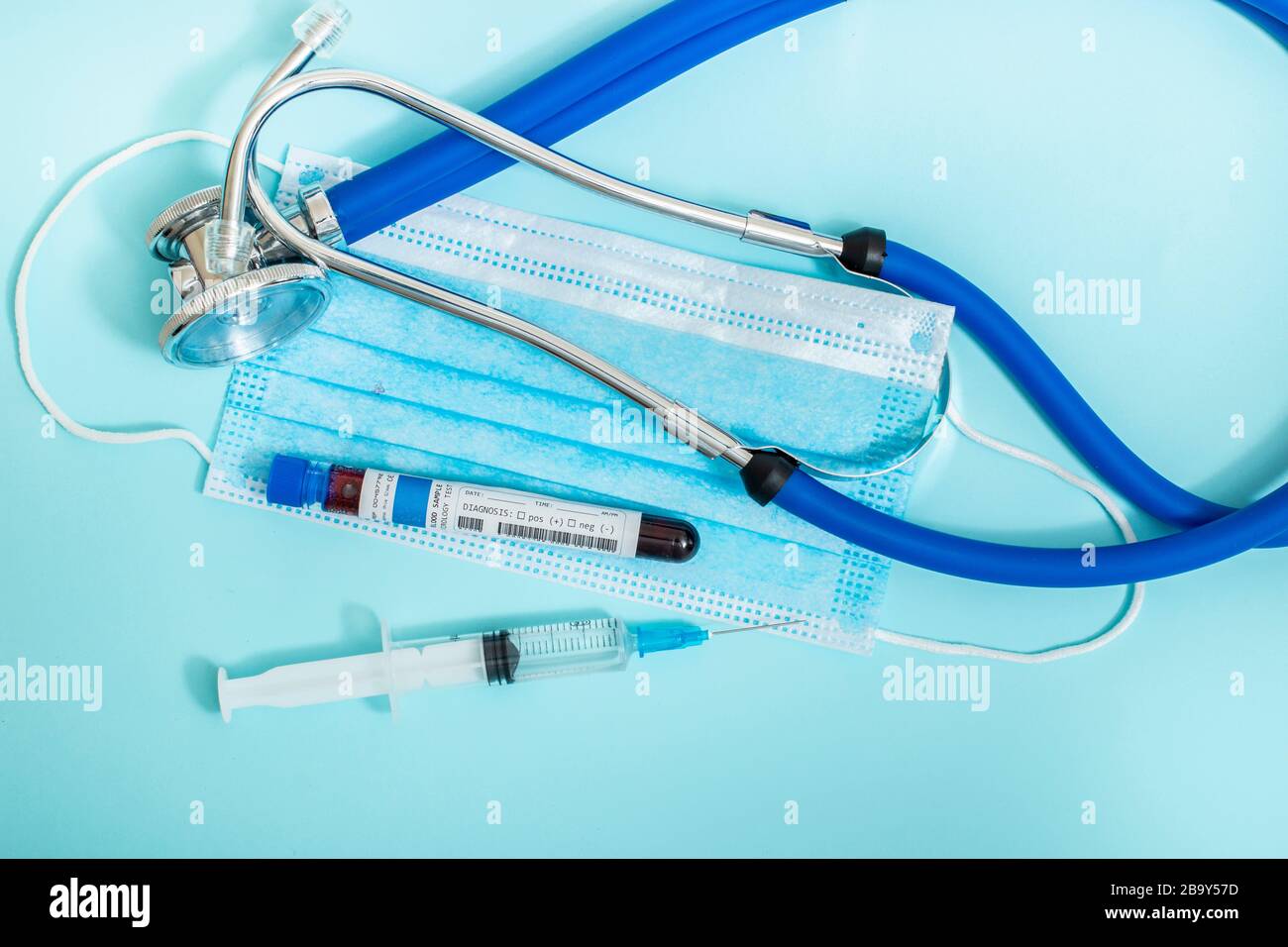 Fictional Blood samples with infected virus, with stethoscope, mask and ...