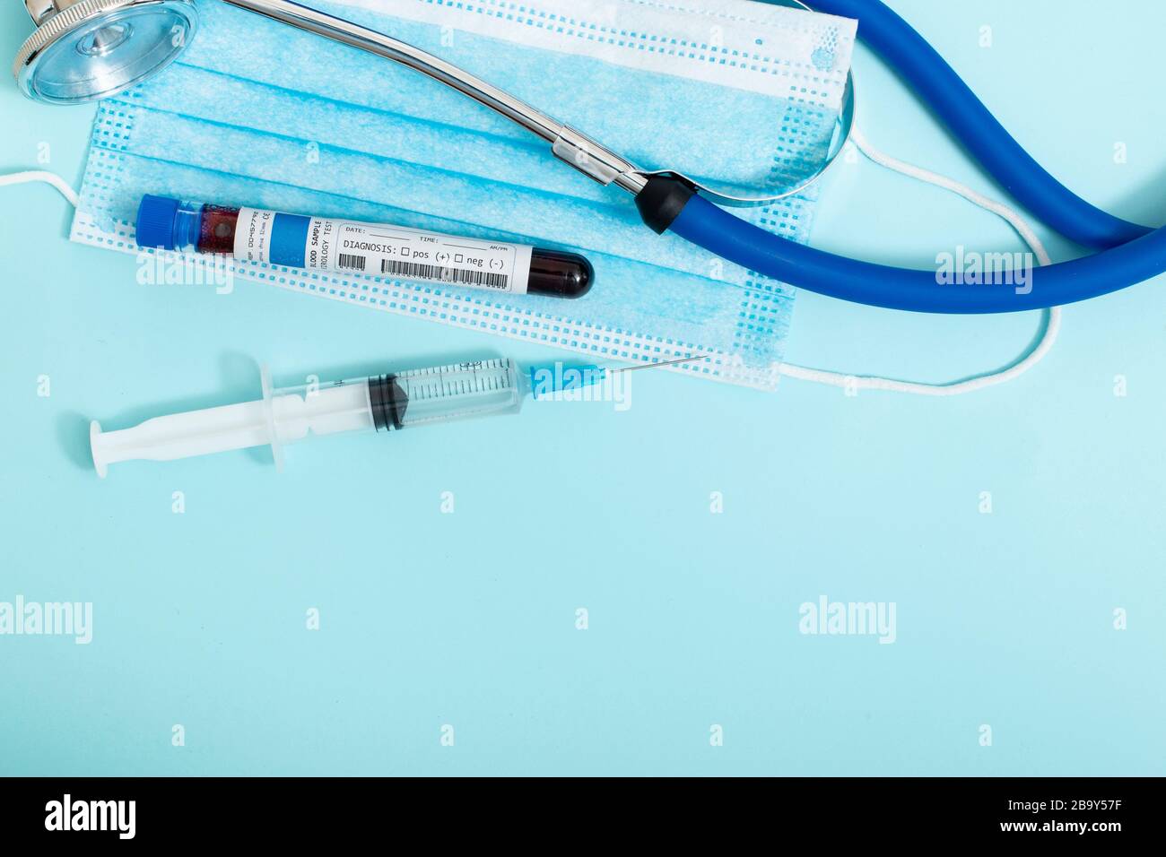 Fictional Blood samples with infected virus, with stethoscope, mask and ...