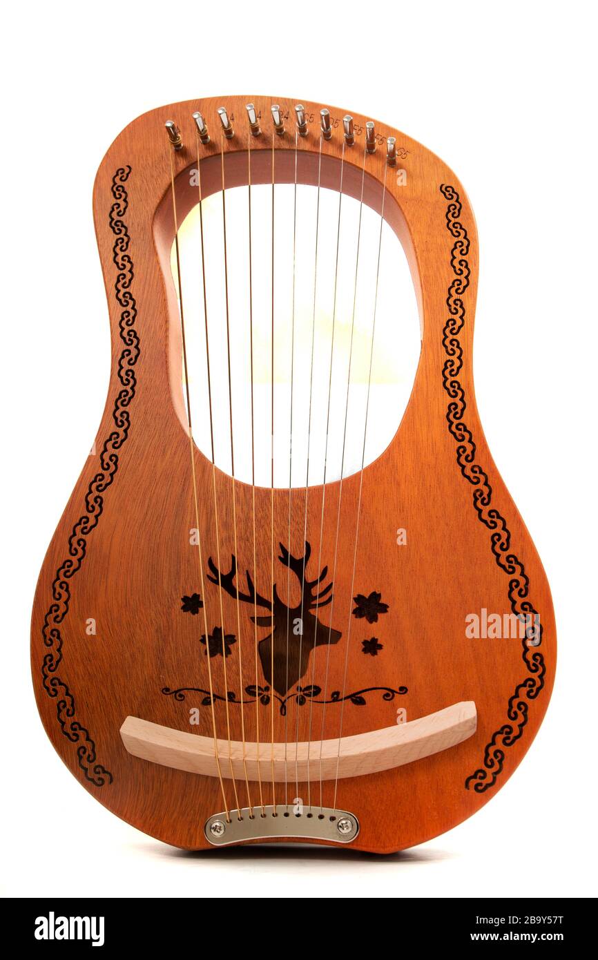 stringed lyre musical instrument isolated on a white background Stock ...