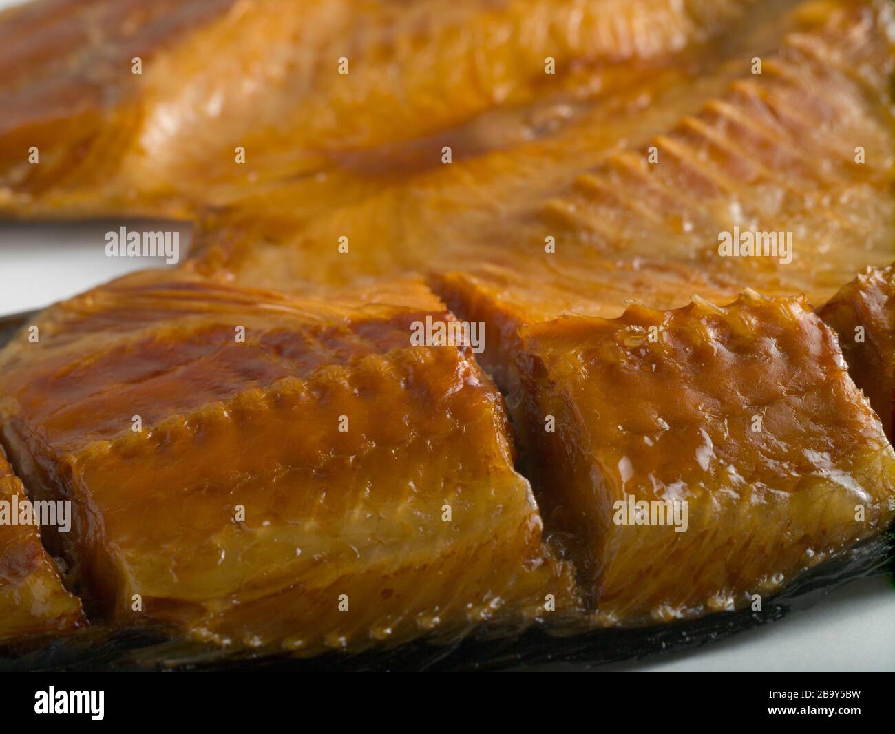 Hot smoked fish. Hot smoked golden carp. Studio light Stock Photo - Alamy