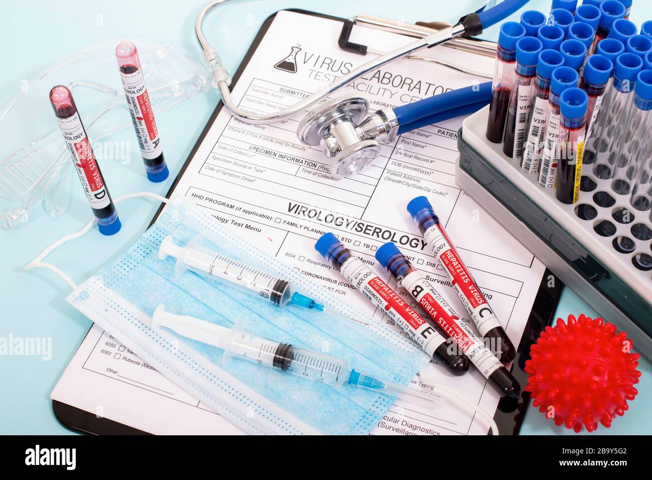 Fictional Blood samples with infected Hepatitis virus, with stethoscope ...