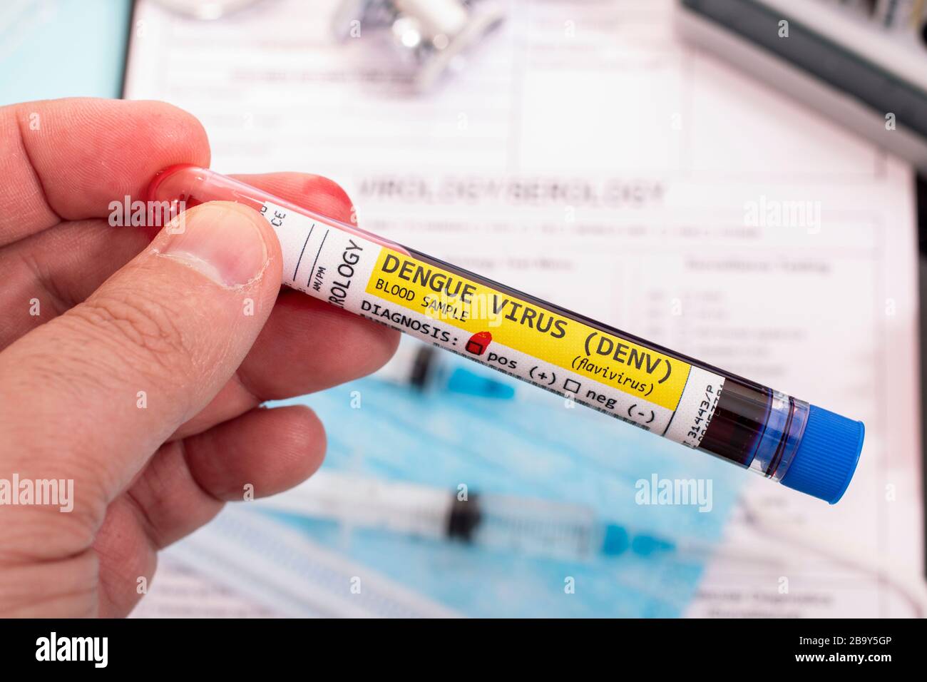 Fictional Blood samples with infected dengue virus, with stethoscope ...