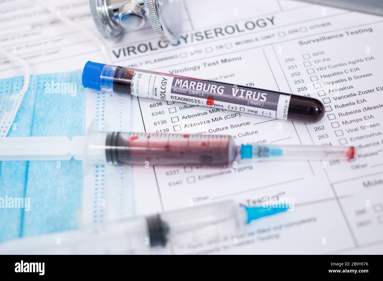 Fictional Blood samples with infected marburg virus, with mask, syringe ...