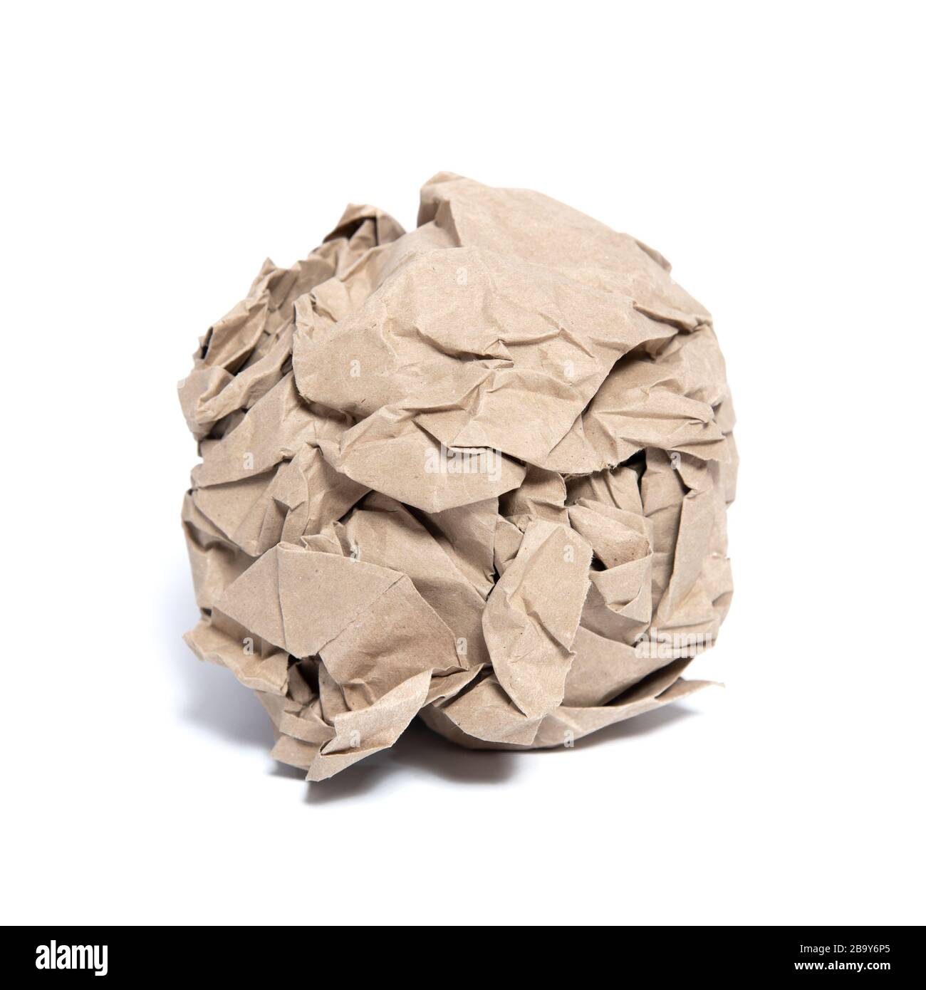Roll of torn paper in the shape of a ball on white background with ...