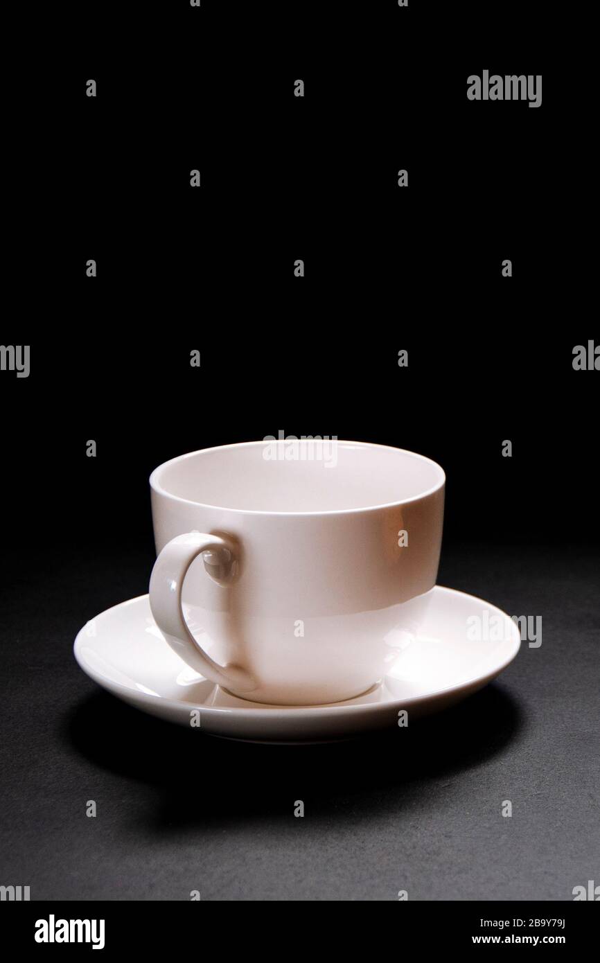 White porcelain cup stands hi-res stock photography and images - Alamy