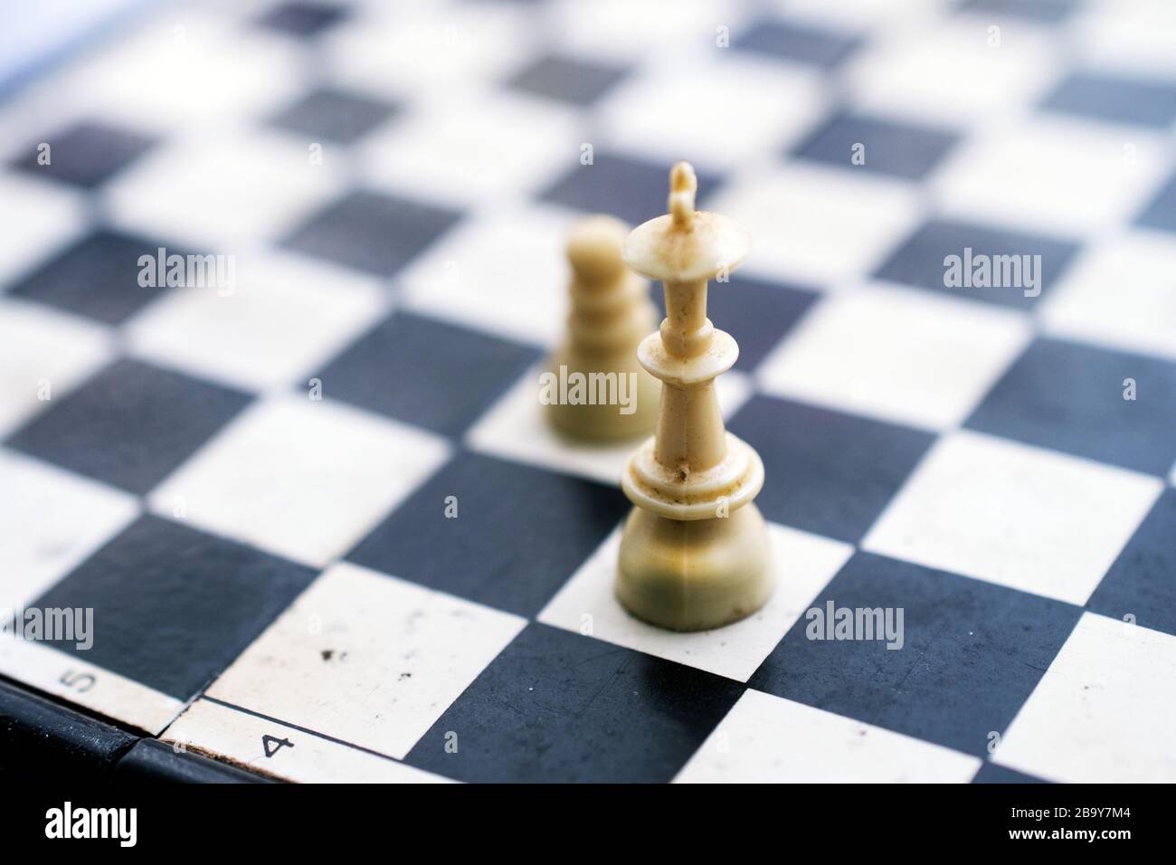 image of a small old dirty chess figurines Stock Photo - Alamy