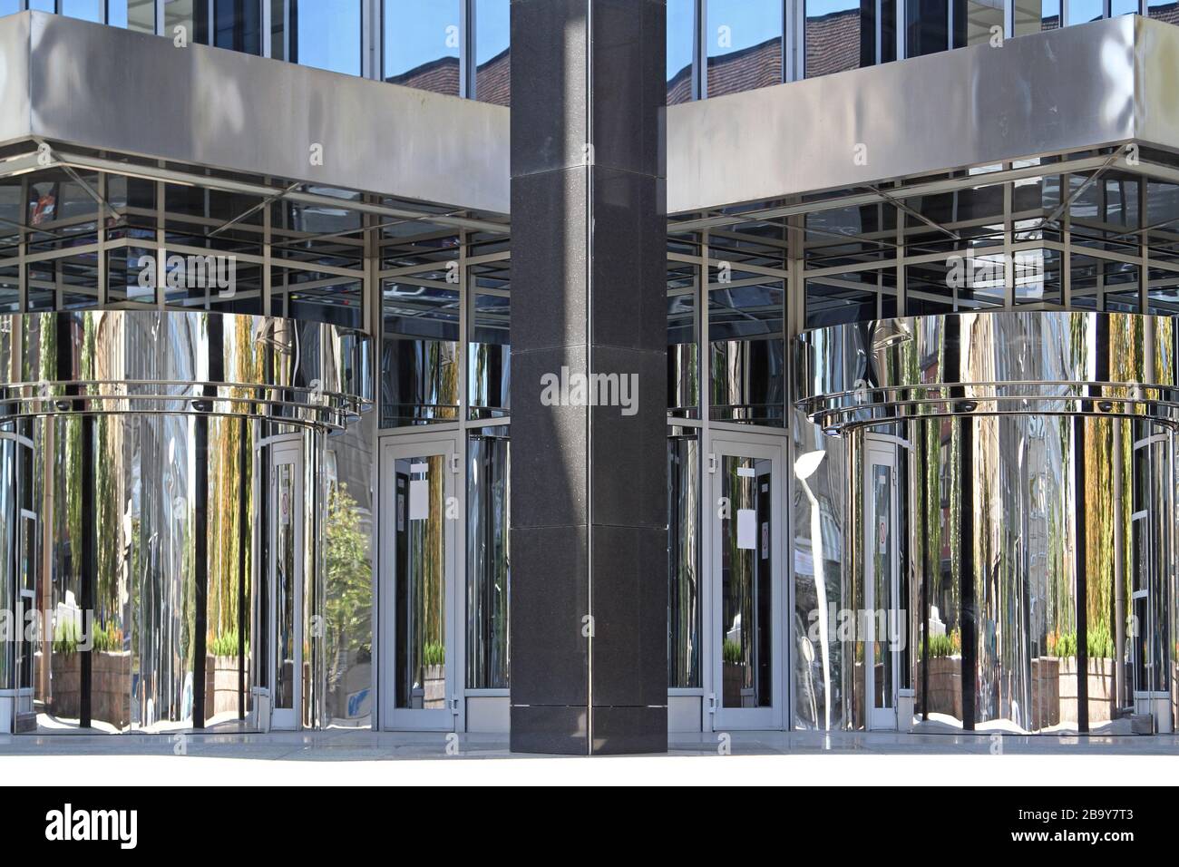 Revolving Silver Doors Entrance to Modern Office Building Stock Photo ...
