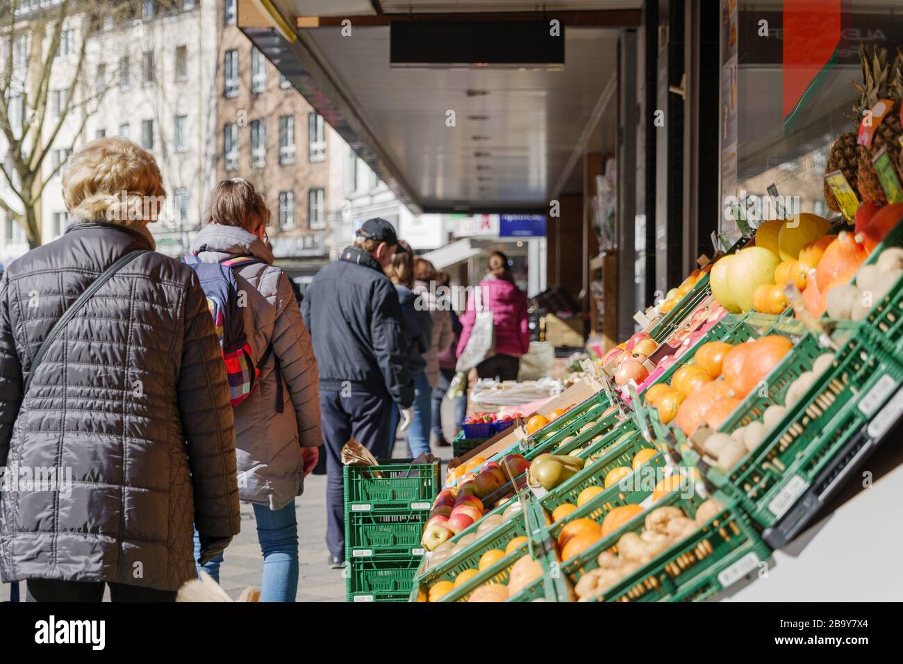 Selected focus, European people queue outside in front of food stall ...