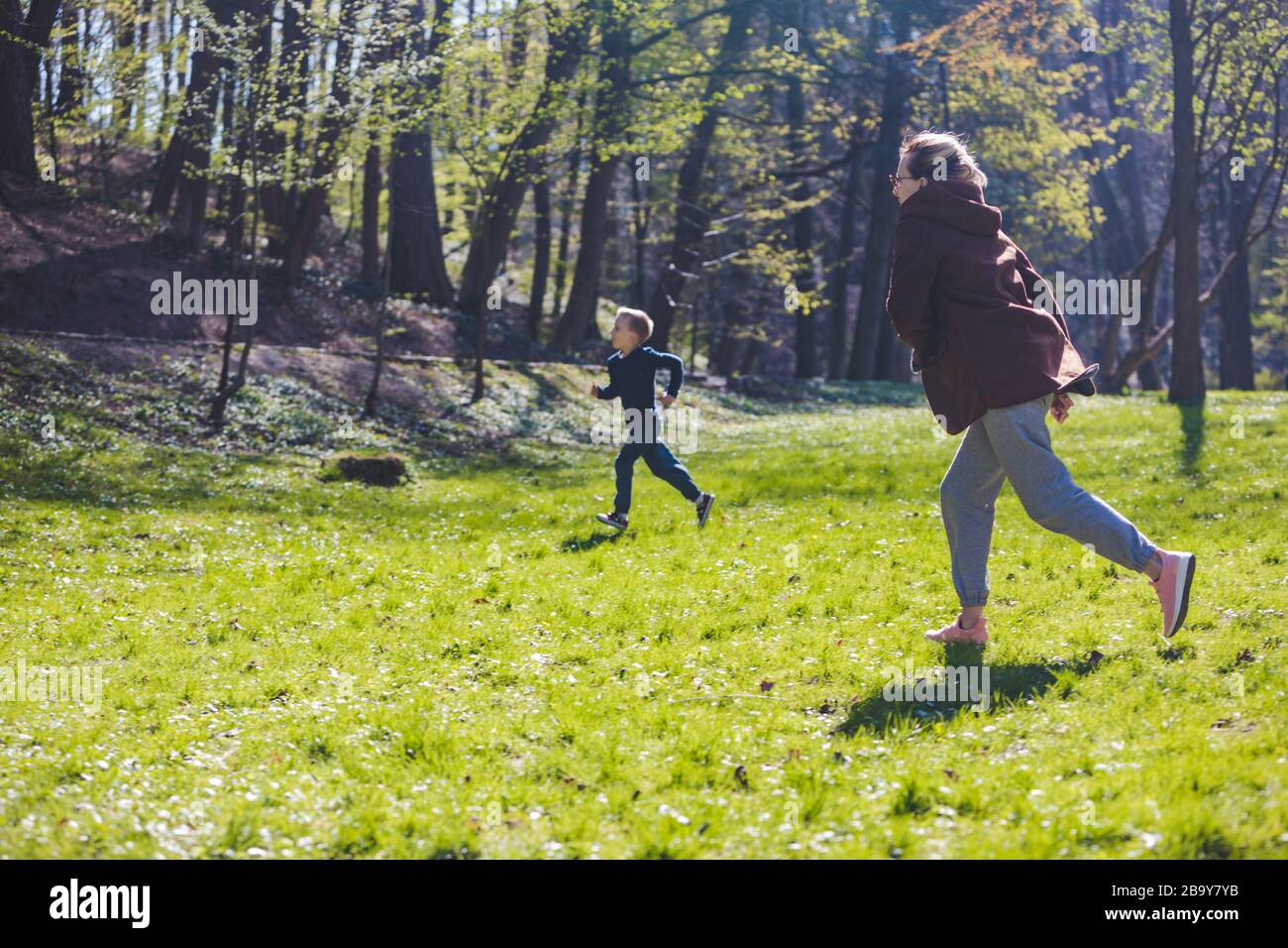 Baby boy running mother hi-res stock photography and images - Alamy