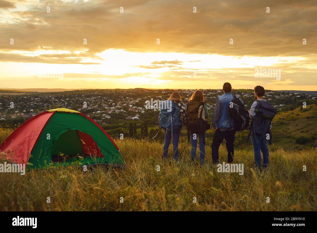 Camping tent camp people tourists standing the sunset in nature Stock ...
