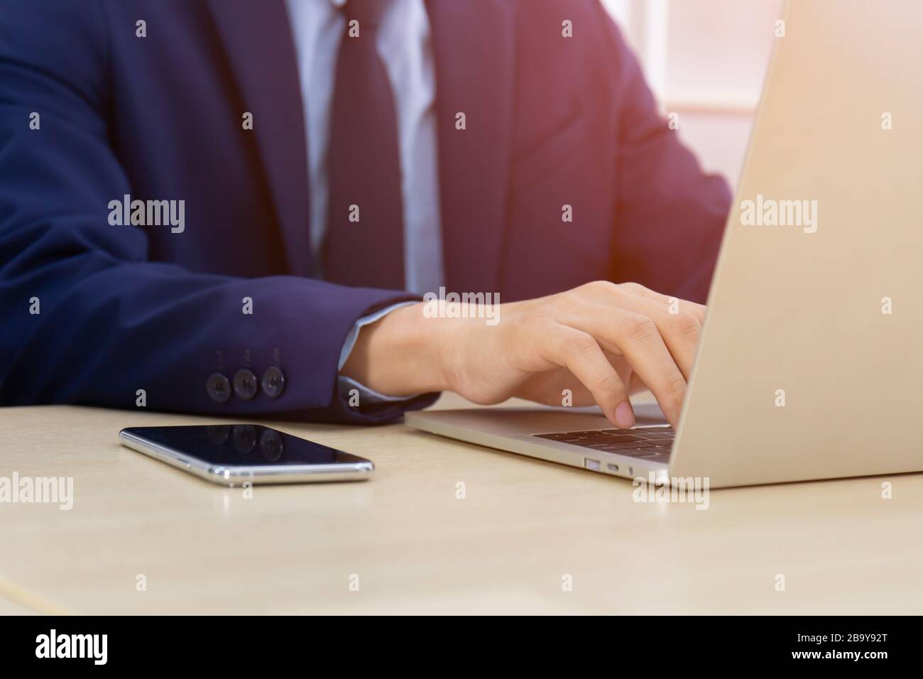 Business man typing hi-res stock photography and images - Alamy