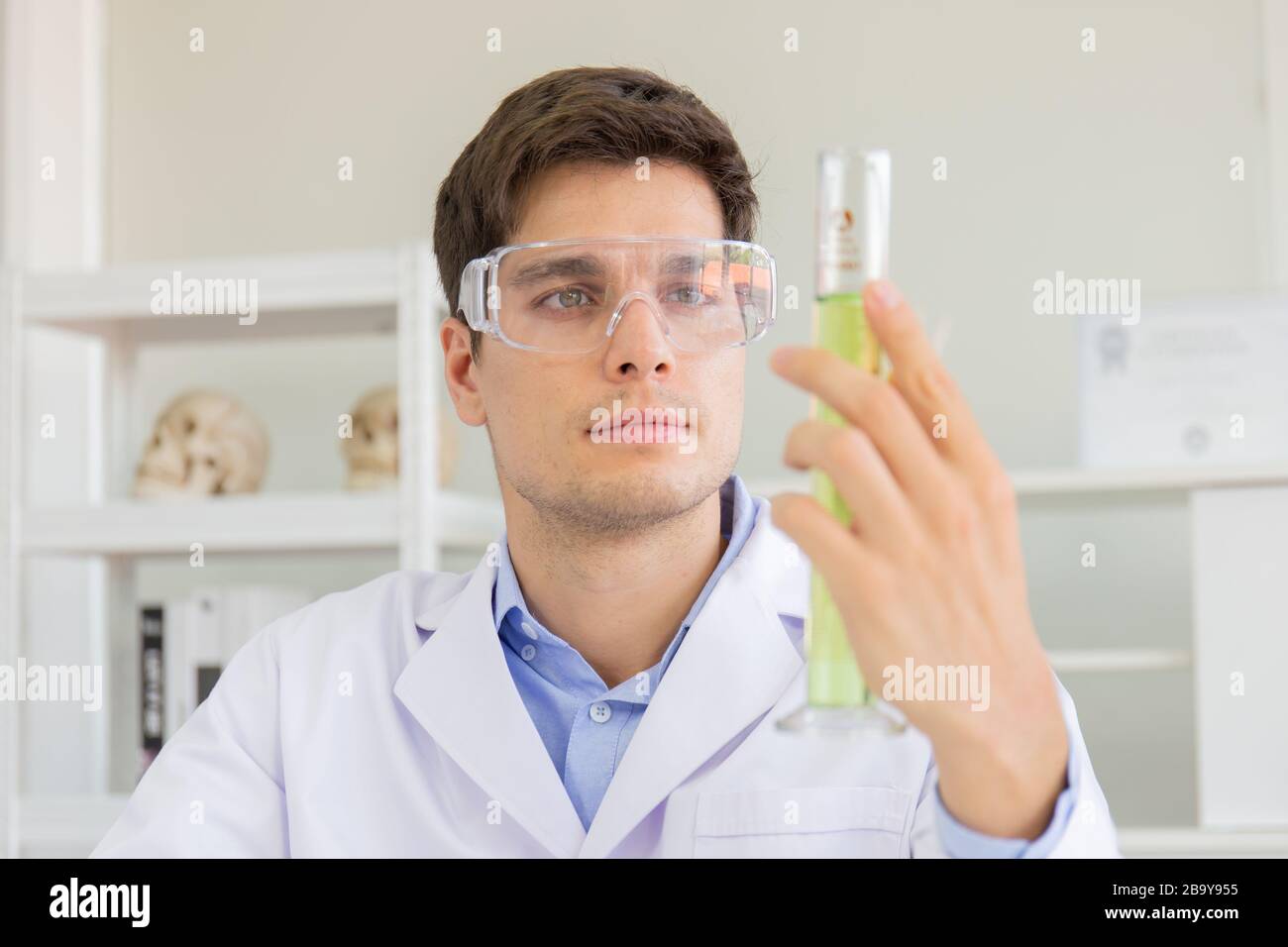 Lab coat beaker hi-res stock photography and images - Alamy