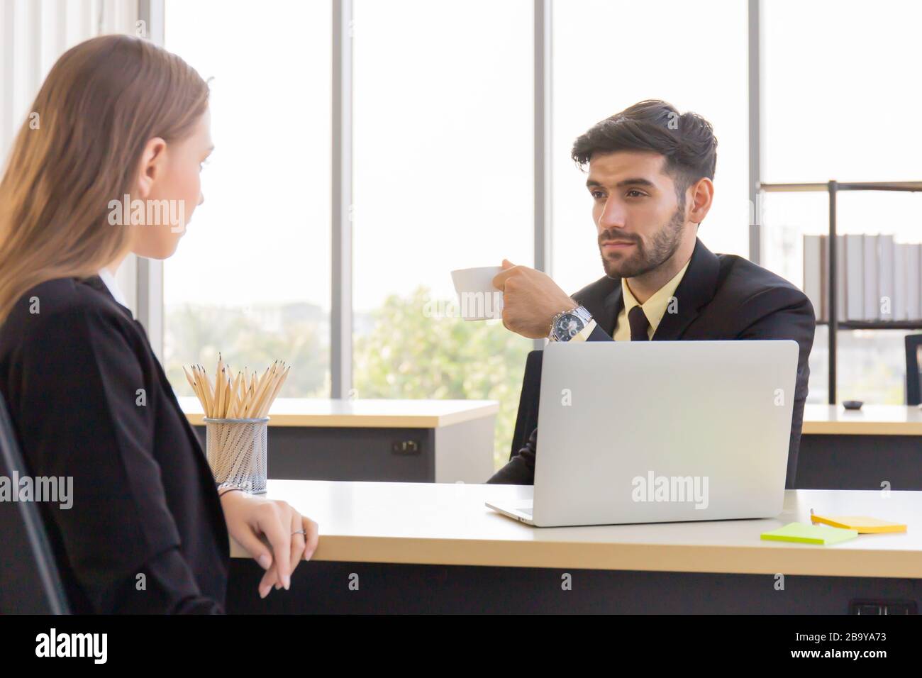 Male secretary to female boss hi-res stock photography and images - Alamy