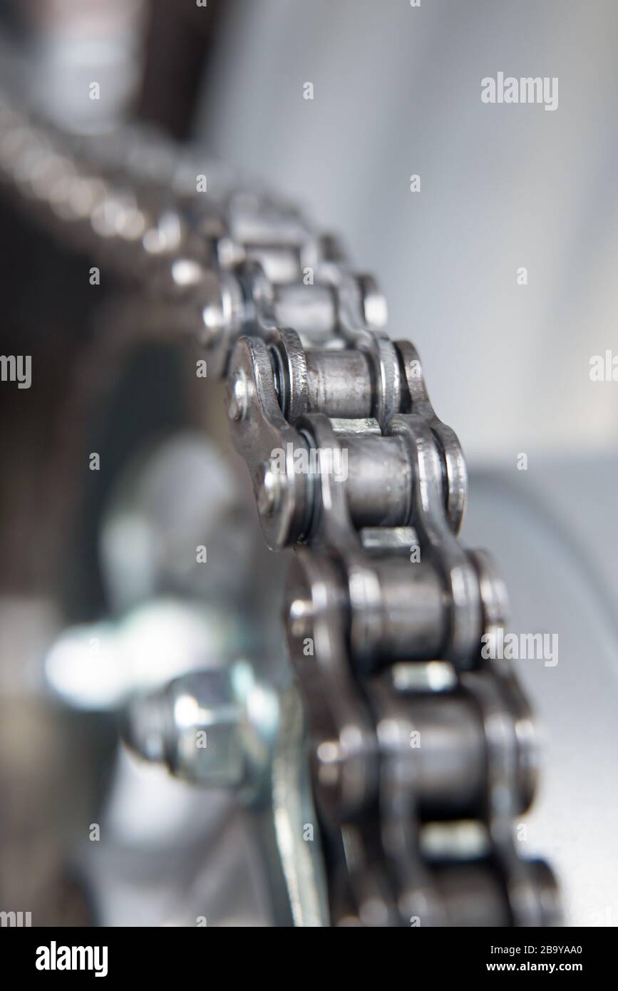A close view of a transimssion chain of a motorbike Stock Photo - Alamy