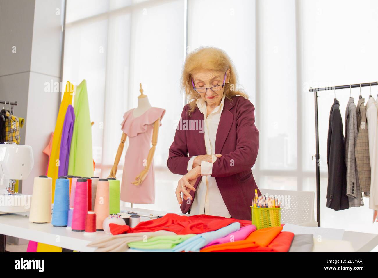 Professional female sewing designers in the office have a variety of ...