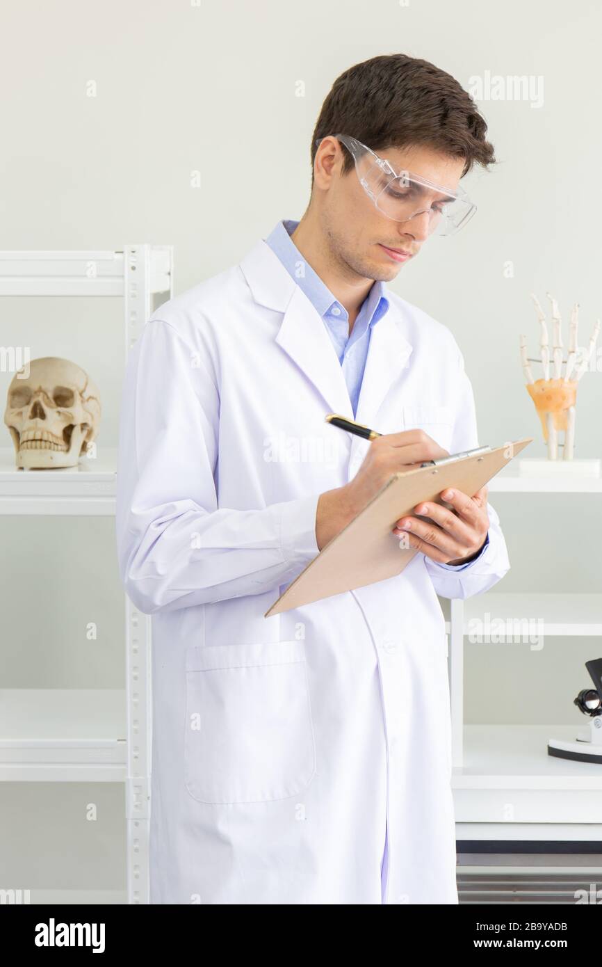 The concept of a new generation of scientific researchers notes data in ...