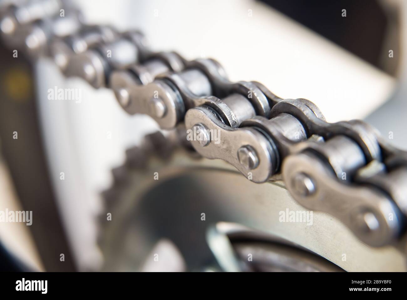 A close view of a transimssion chain of a motorbike Stock Photo - Alamy