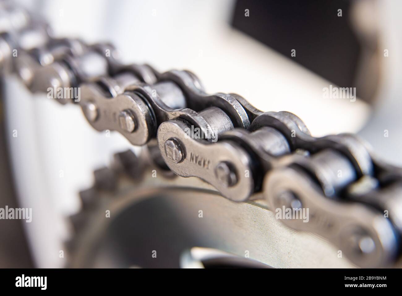 A close view of a transimssion chain of a motorbike Stock Photo - Alamy