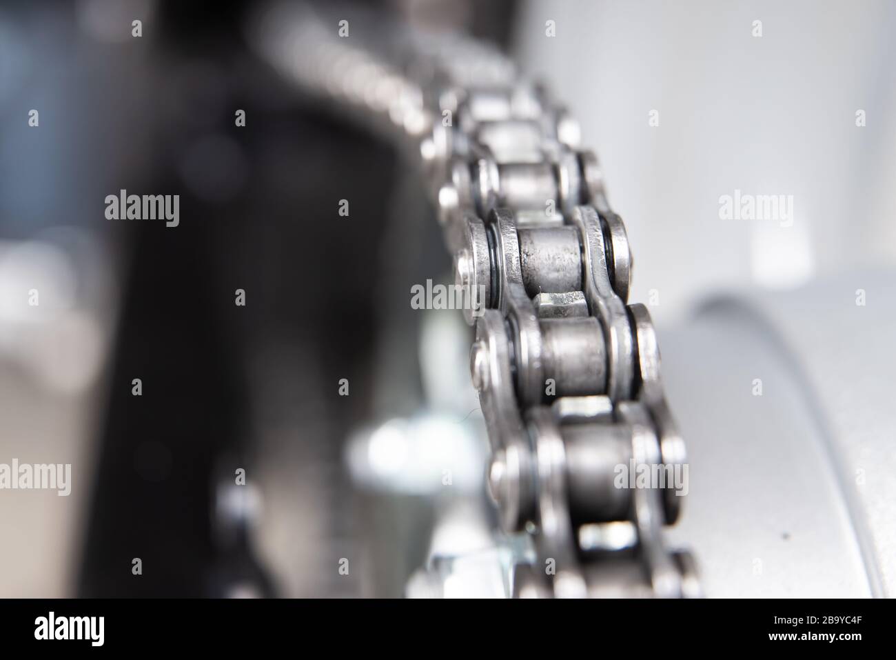 A close view of a transimssion chain of a motorbike Stock Photo - Alamy