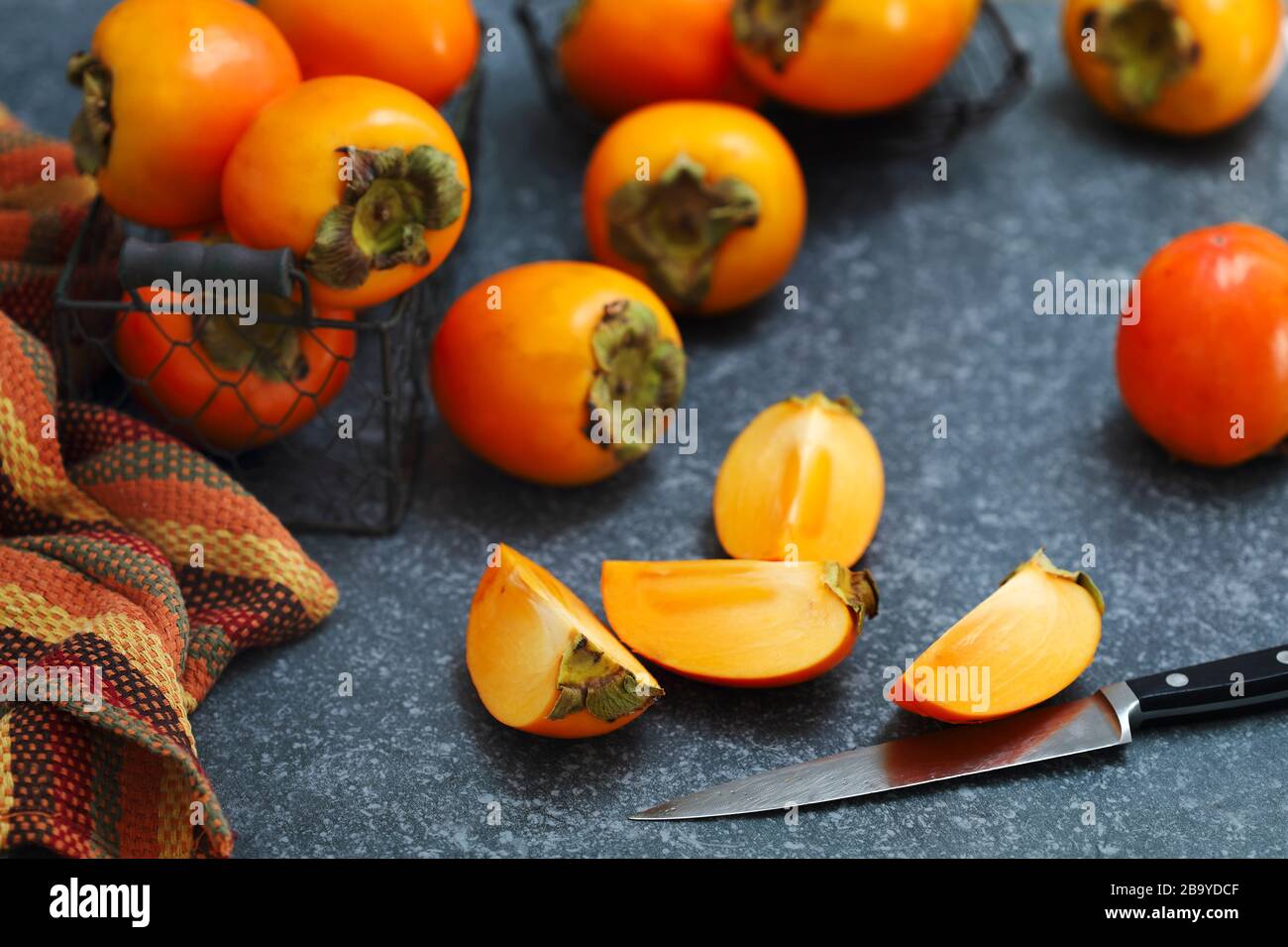 Delicious fresh persimmon fruits Stock Photo - Alamy