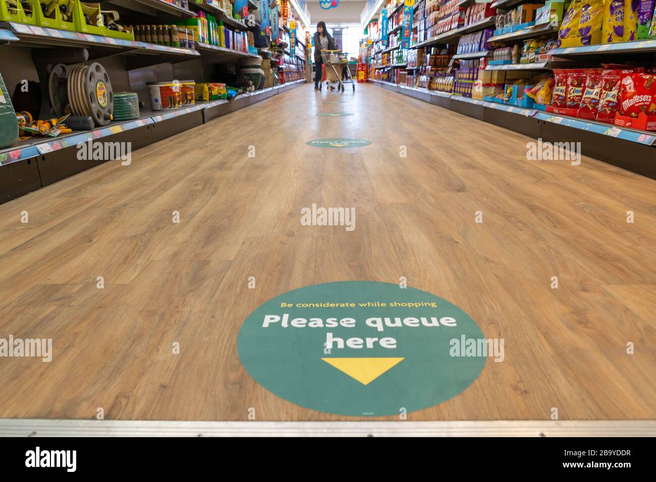 Spaces on the floor of Morrisons supermarket indicating where to stand ...