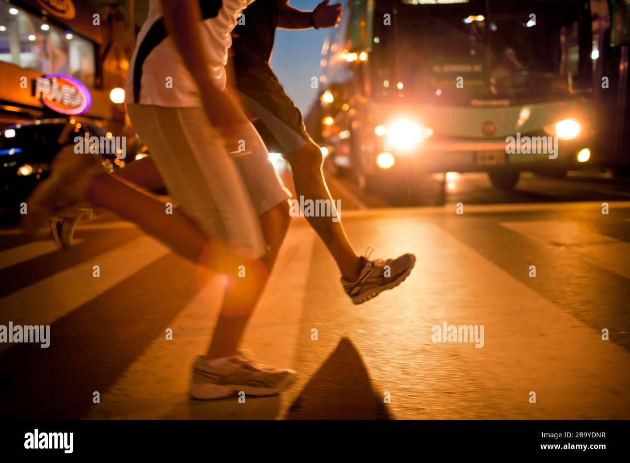 Running across road city pedestrian hi-res stock photography and images ...