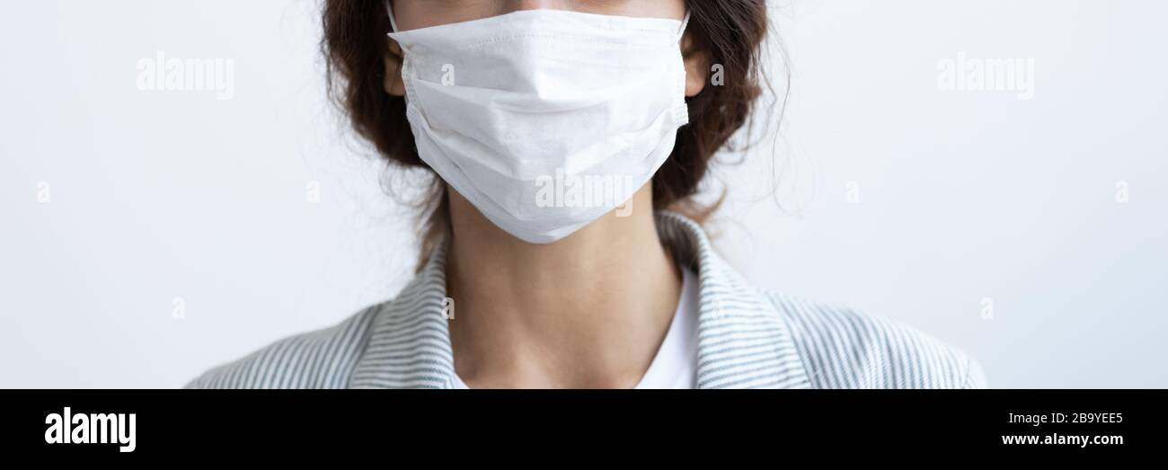 Woman wearing medical face mask hi-res stock photography and images - Alamy