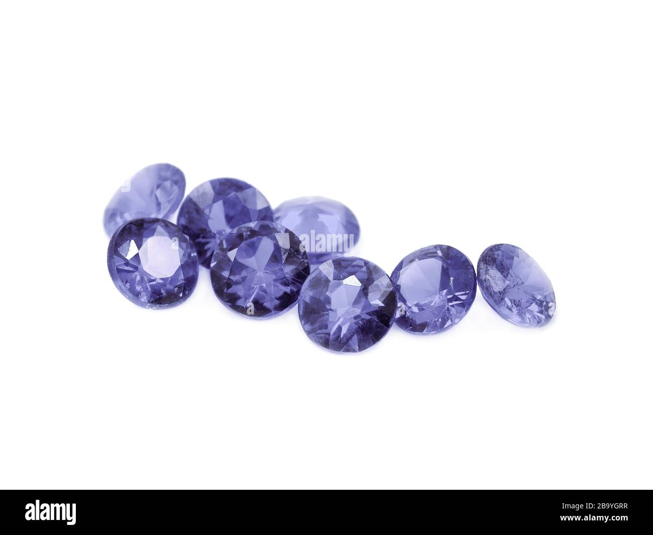 Purple diamond cut gems on a white background Stock Photo - Alamy