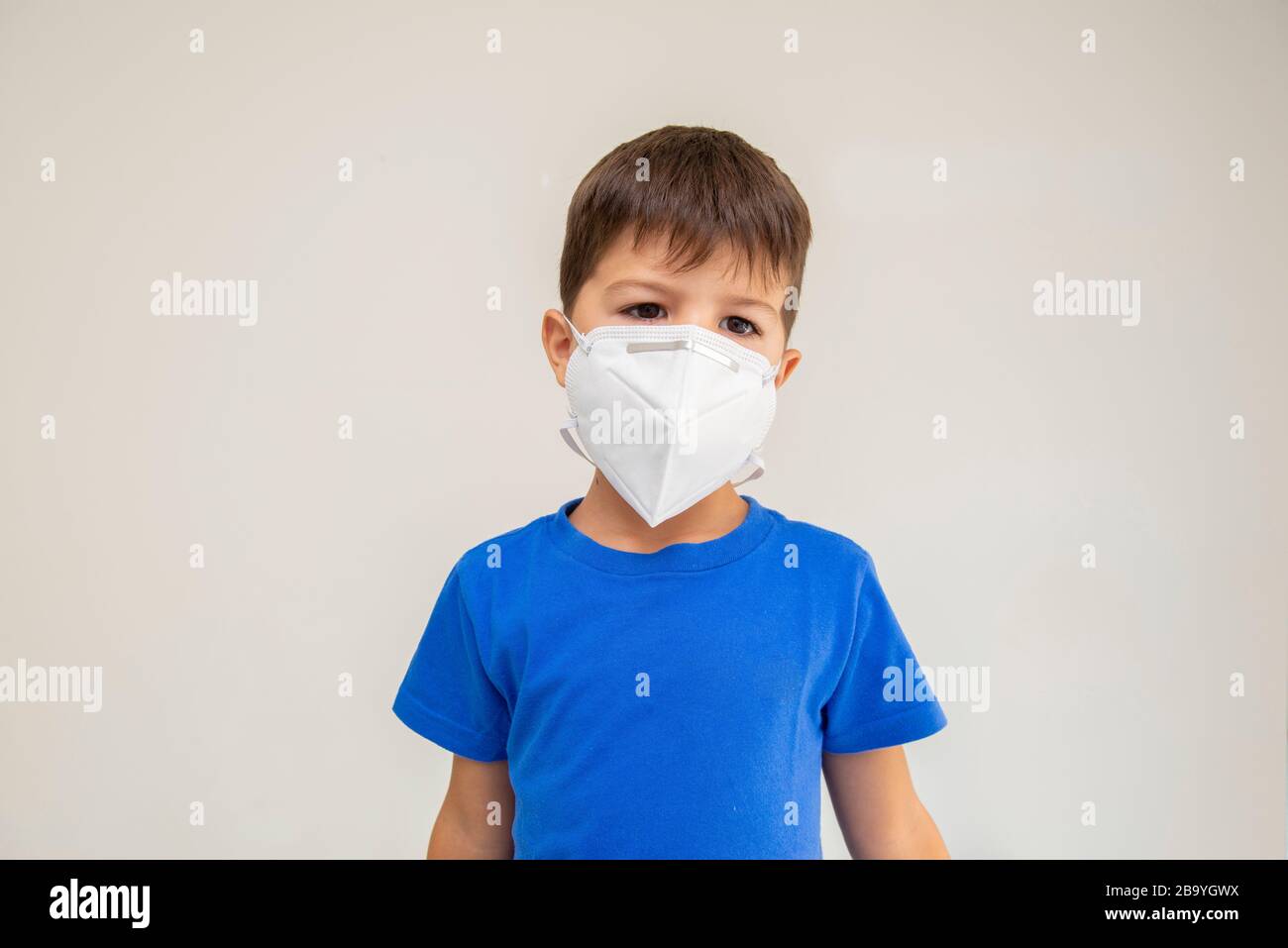Boy wearing surgical mask hi-res stock photography and images - Alamy