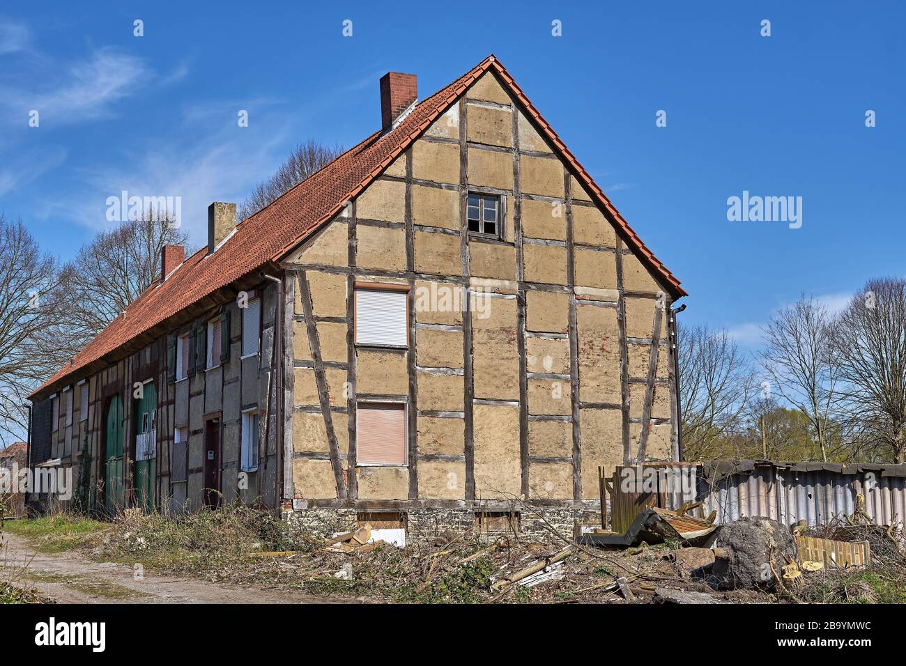Old half-timbered house facade with exposed wooden beams. The old ...