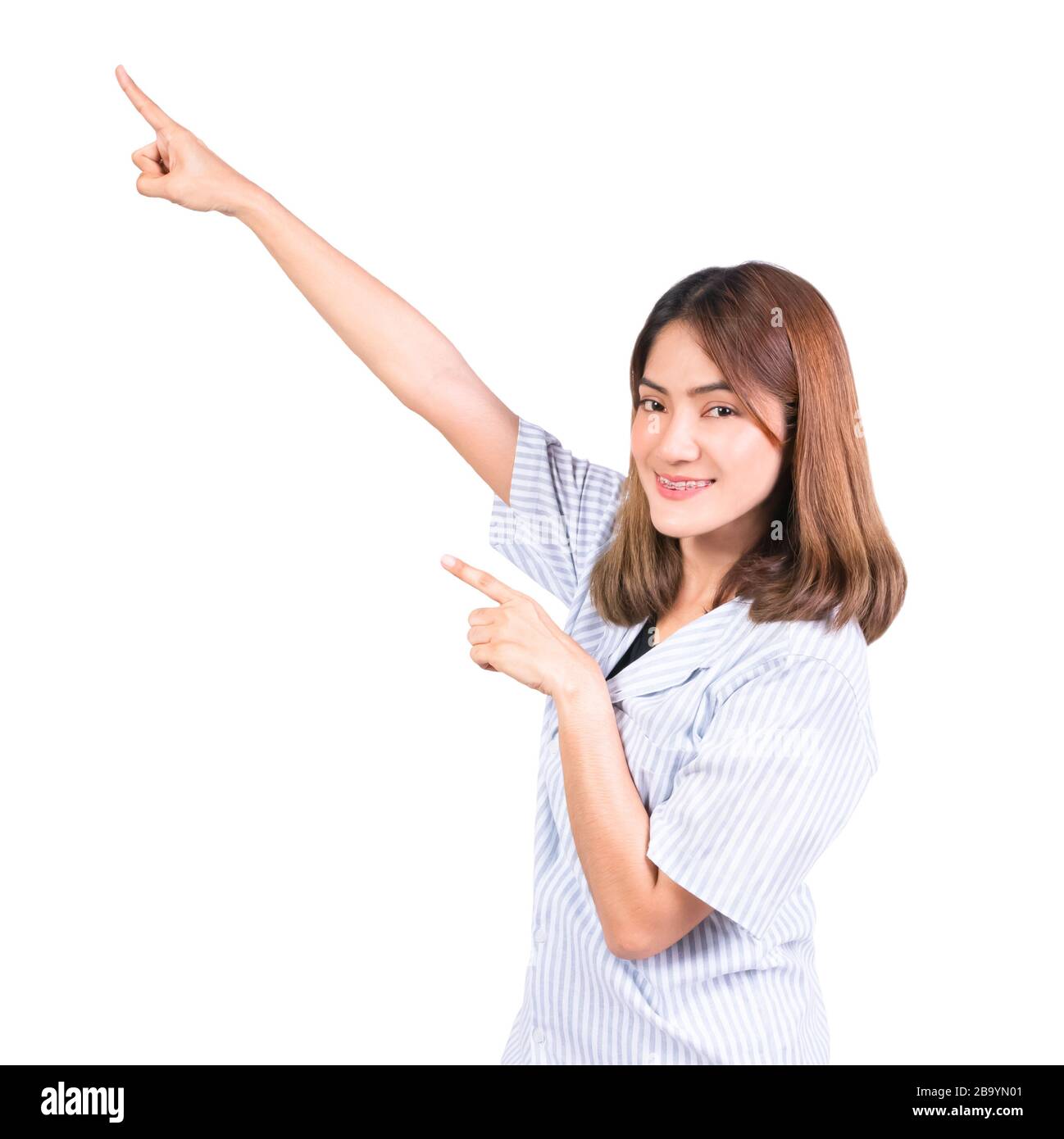 woman pointing finger up portrait on white background Stock Photo - Alamy
