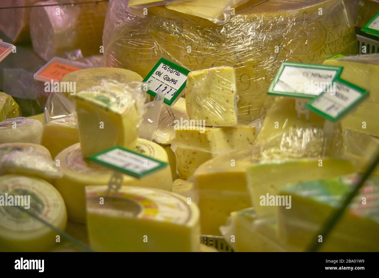 Cheeses on sale on the counter of the grocery store 4 Stock Photo - Alamy