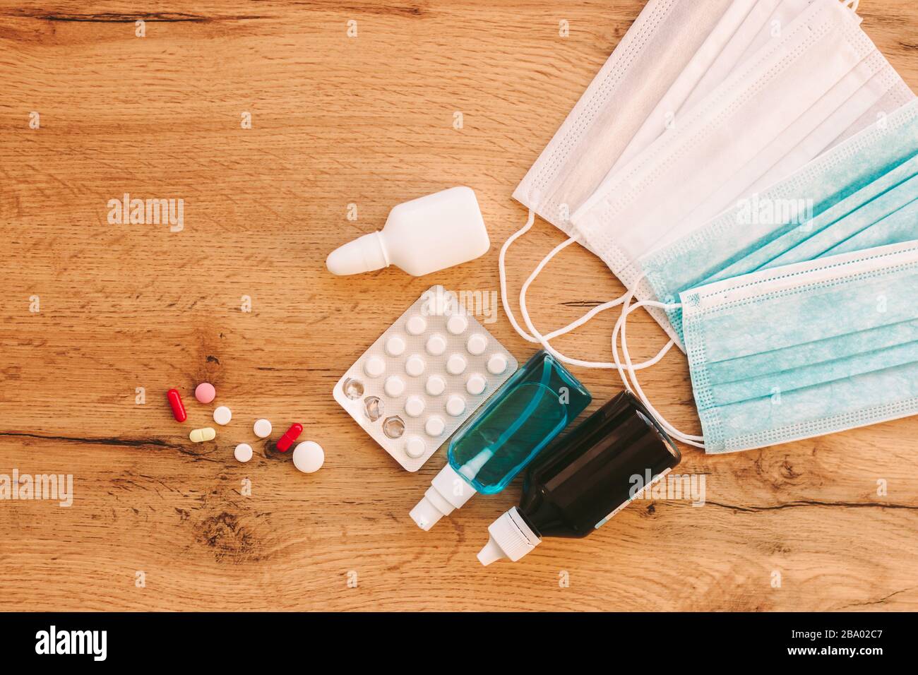 Top view of different pills, tablets, drugs, medicaments, sanitizers ...