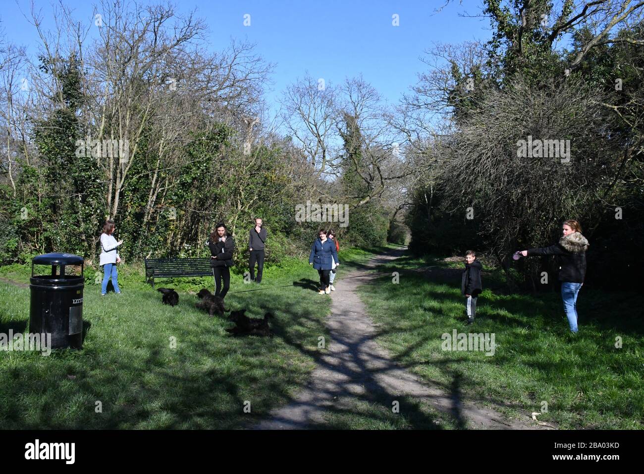 Kent, UK. 25th Mar, 2020. People in Franks Park in Erith during ...