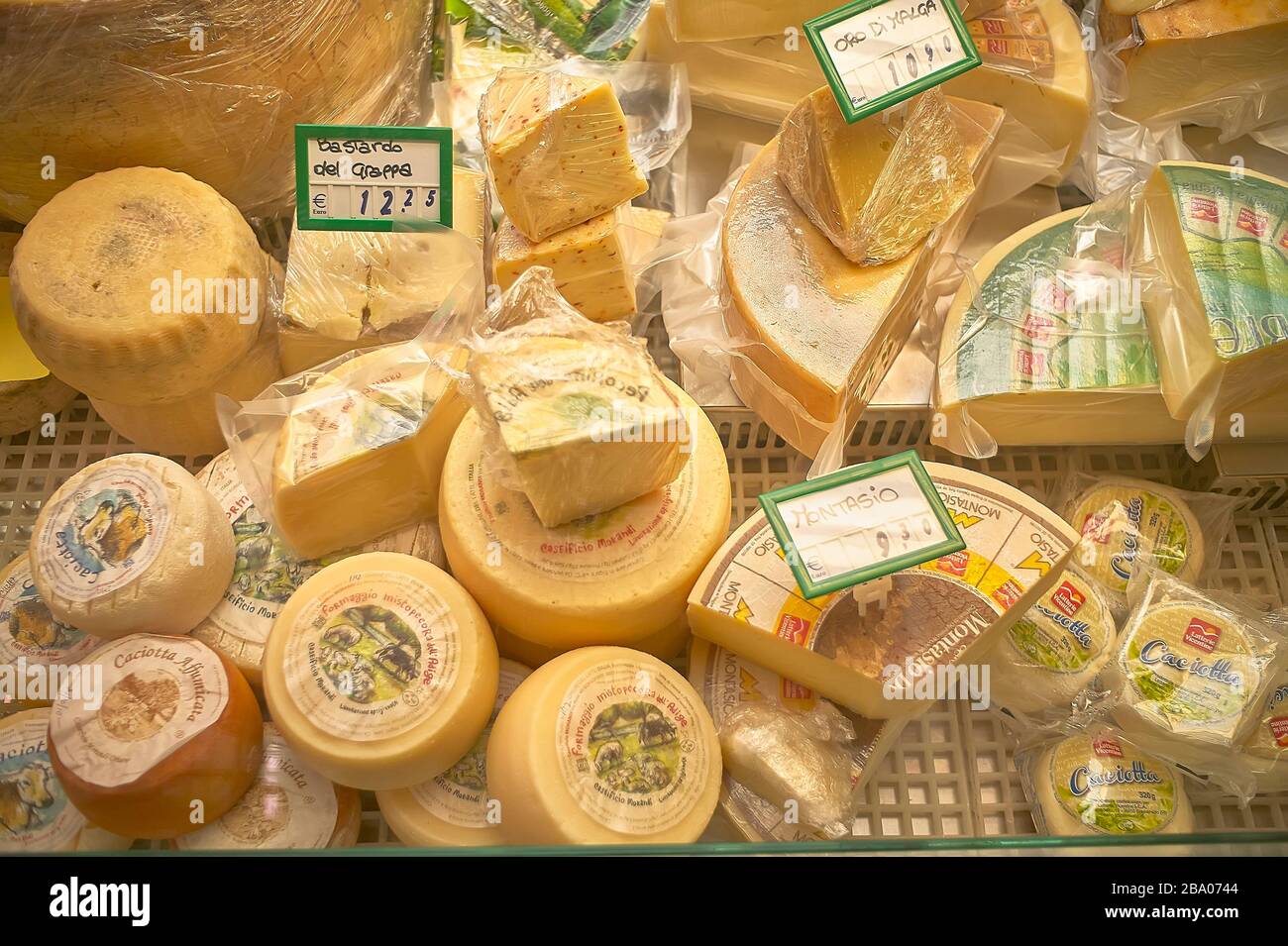 Cheeses on sale on the counter of the grocery store 9 Stock Photo - Alamy