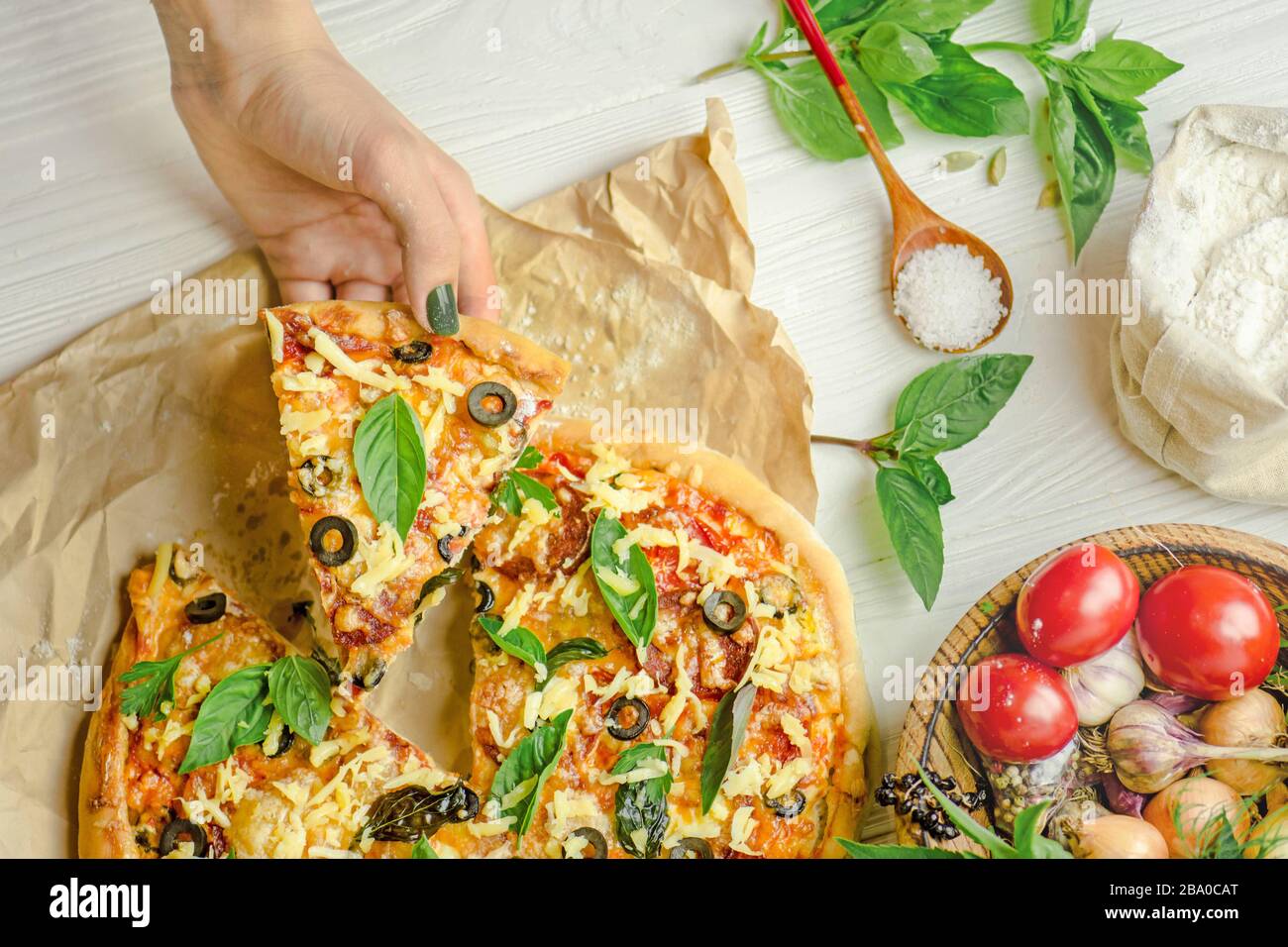 Hands taking slices of pizza. Hand holding slice pizza. Hand taking ...