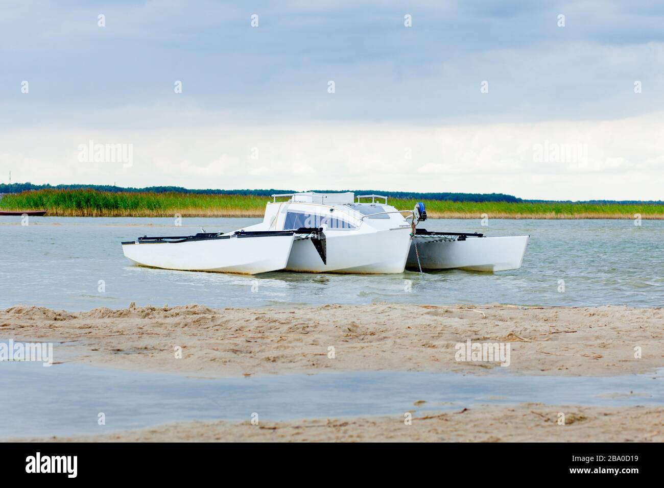 All new sailing catamaran on daily tour on shallow Stock Photo - Alamy