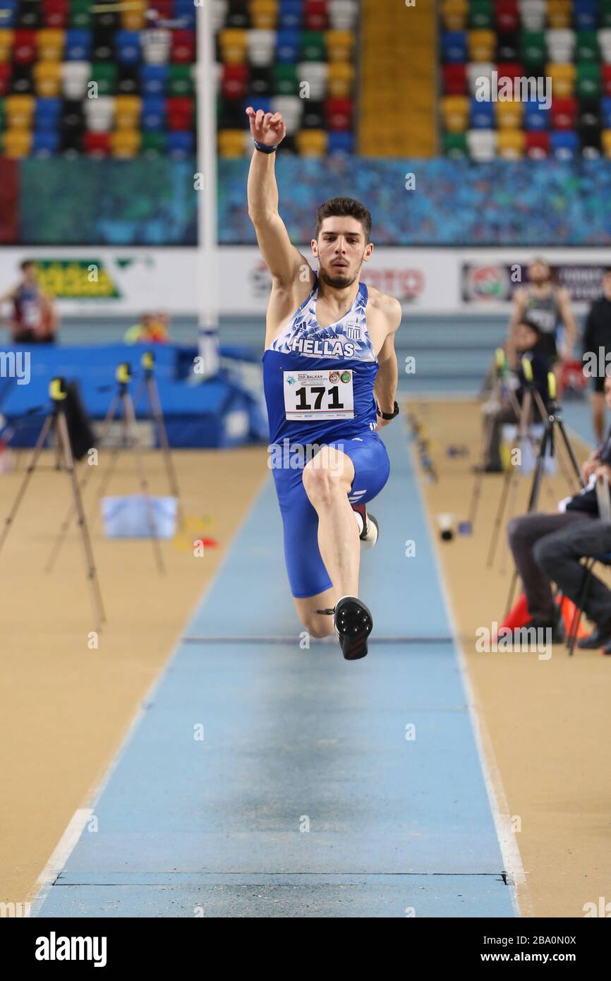 ISTANBUL, TURKEY - FEBRUARY 15, 2020: Undefined athlete triple jumping ...