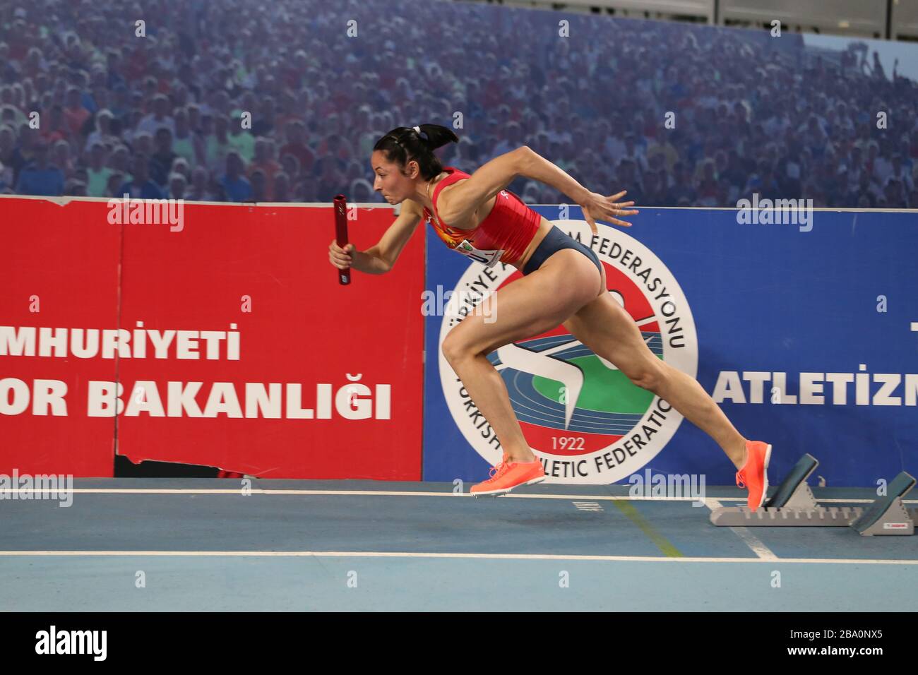 ISTANBUL, TURKEY - FEBRUARY 15, 2020: Undefined athlete running 4x400 ...