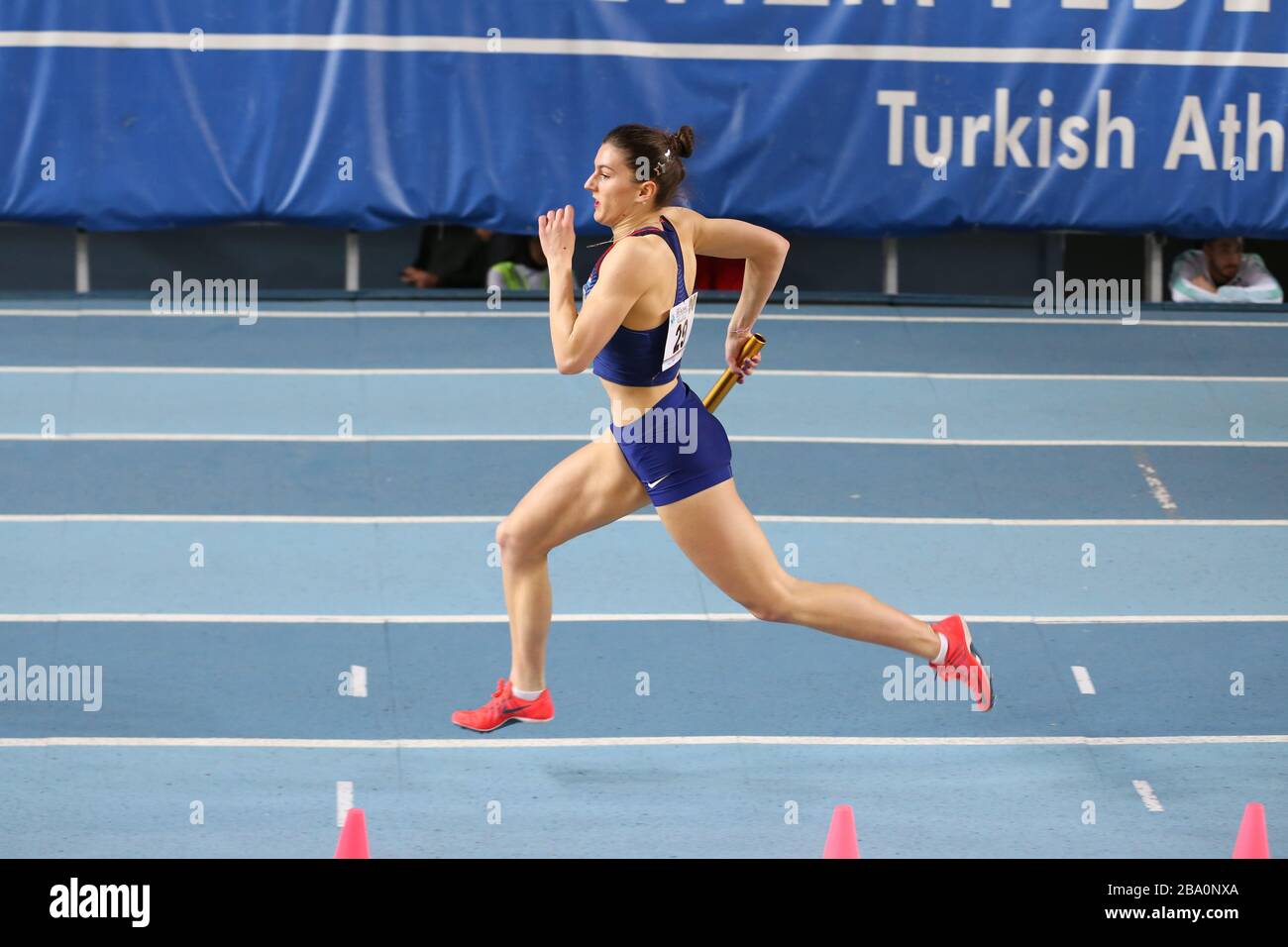 ISTANBUL, TURKEY - FEBRUARY 15, 2020: Undefined athlete running 4x400 ...