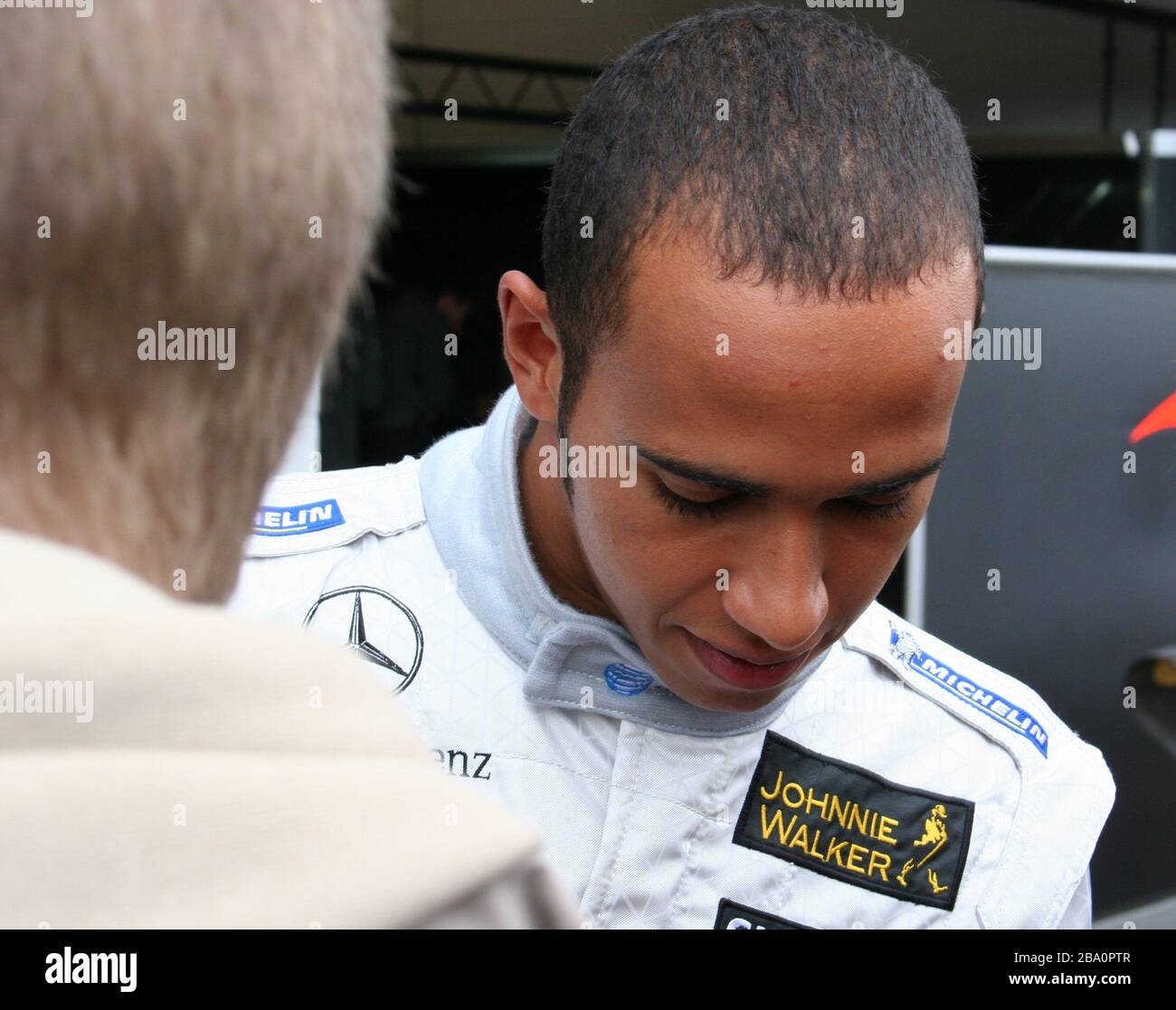 Lewis Hamilton signing autographs First official test day for Mclaren ...