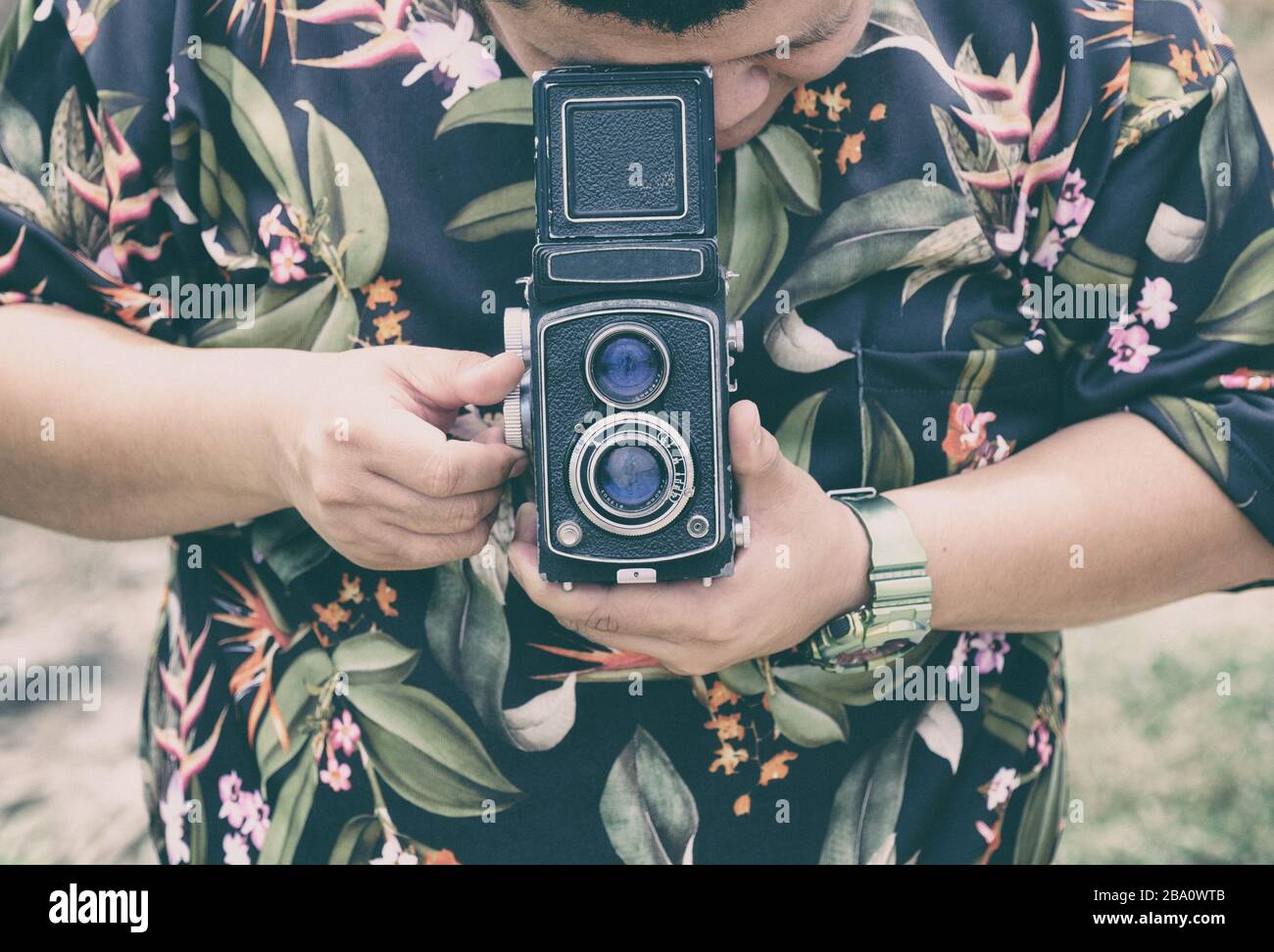 Man hands holding camera filming hi-res stock photography and images ...