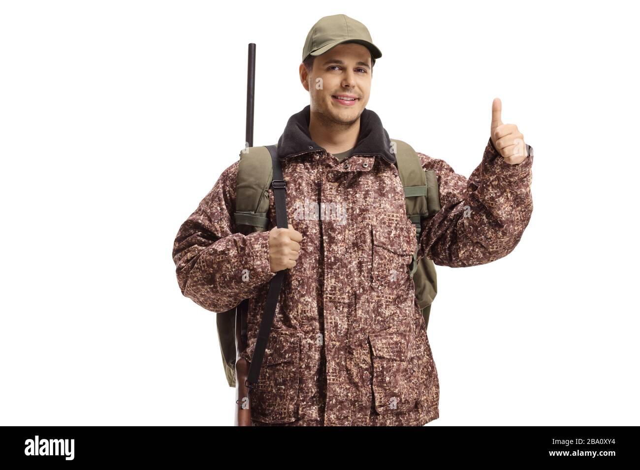 Hunter in a disguise uniform showing thumbs up isolated on white ...