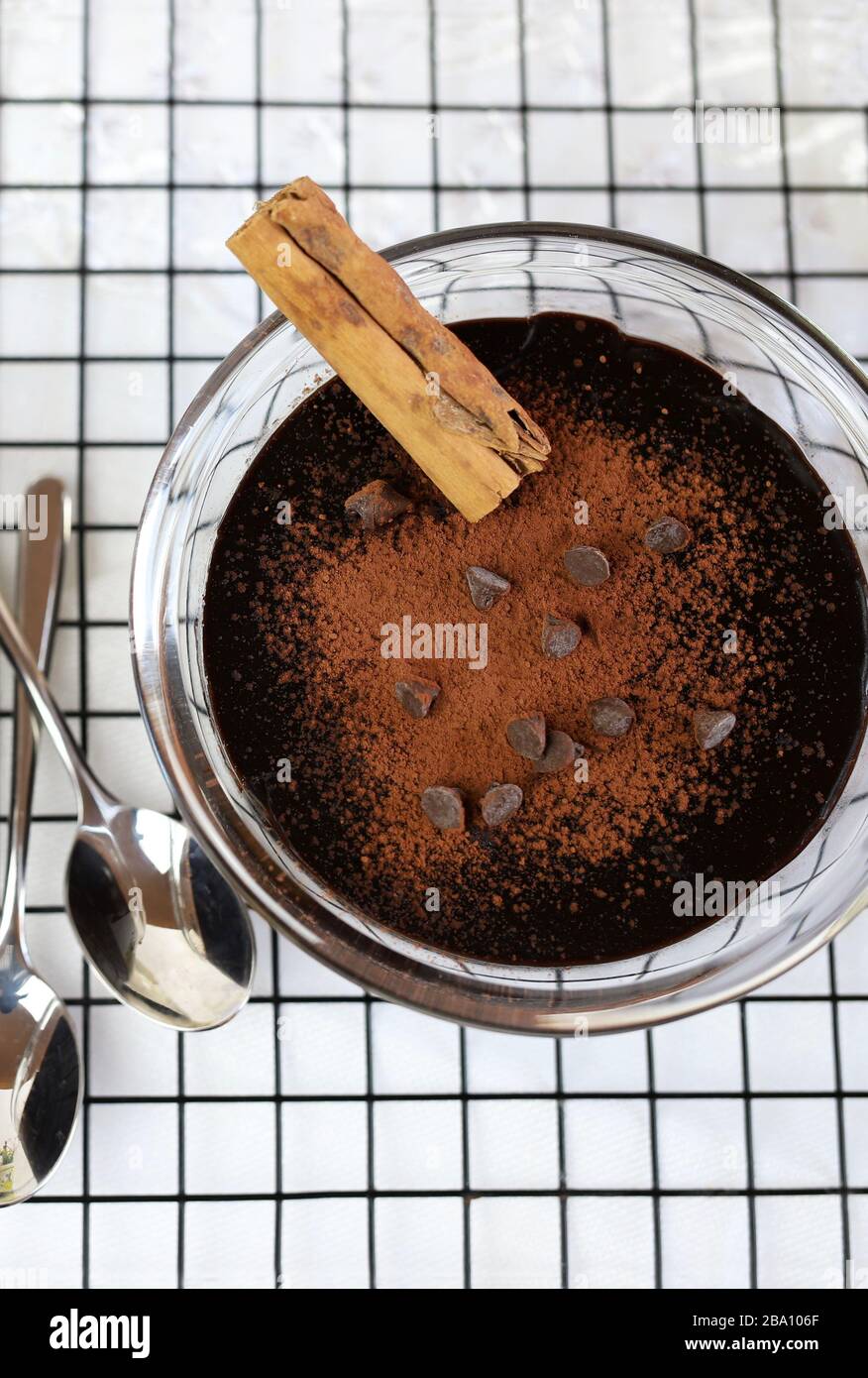 Chocolate pudding sprinkled with cocoa powder and decorated with ...