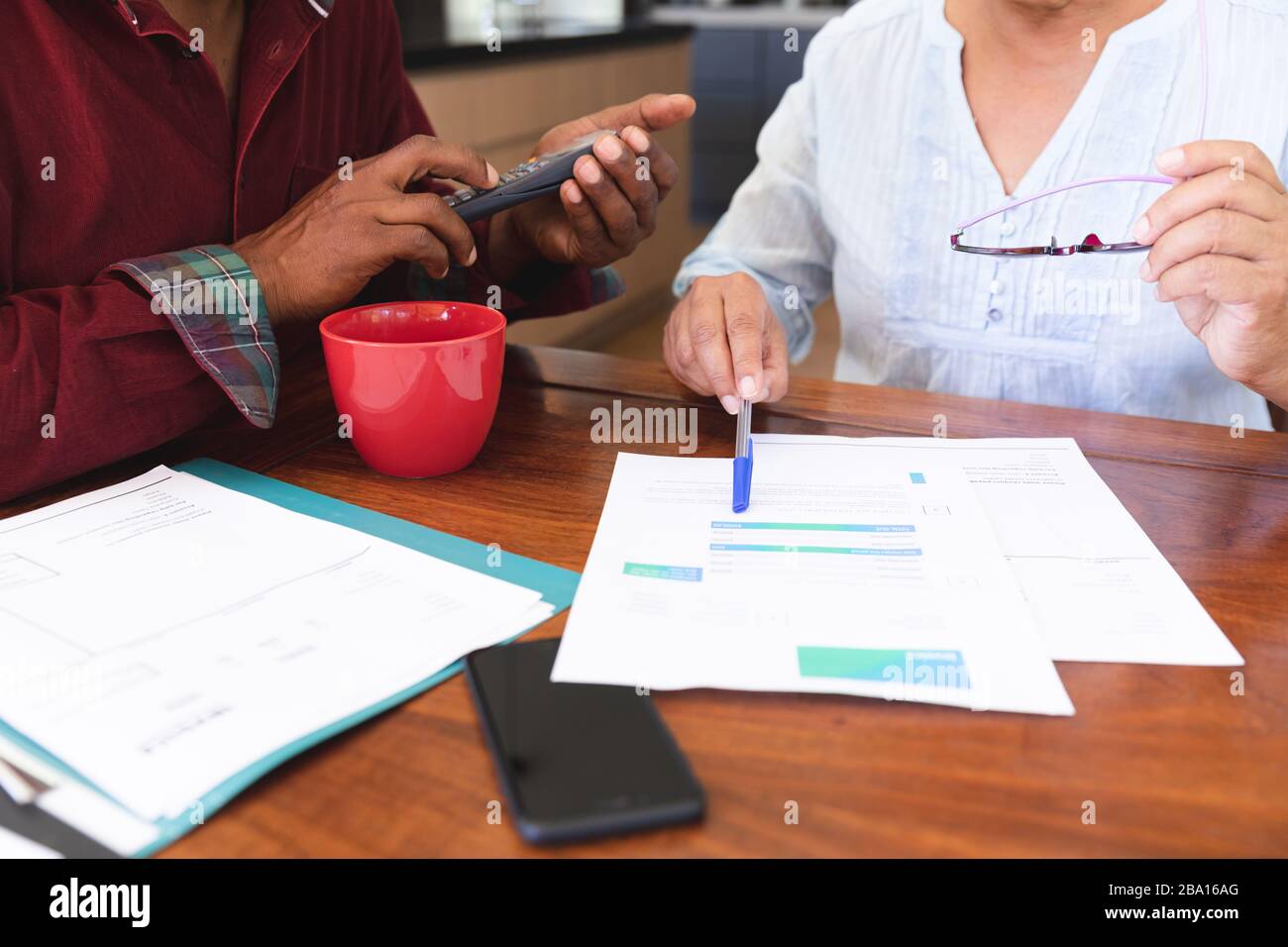 Senior African American couple doing their administrative papers Stock ...