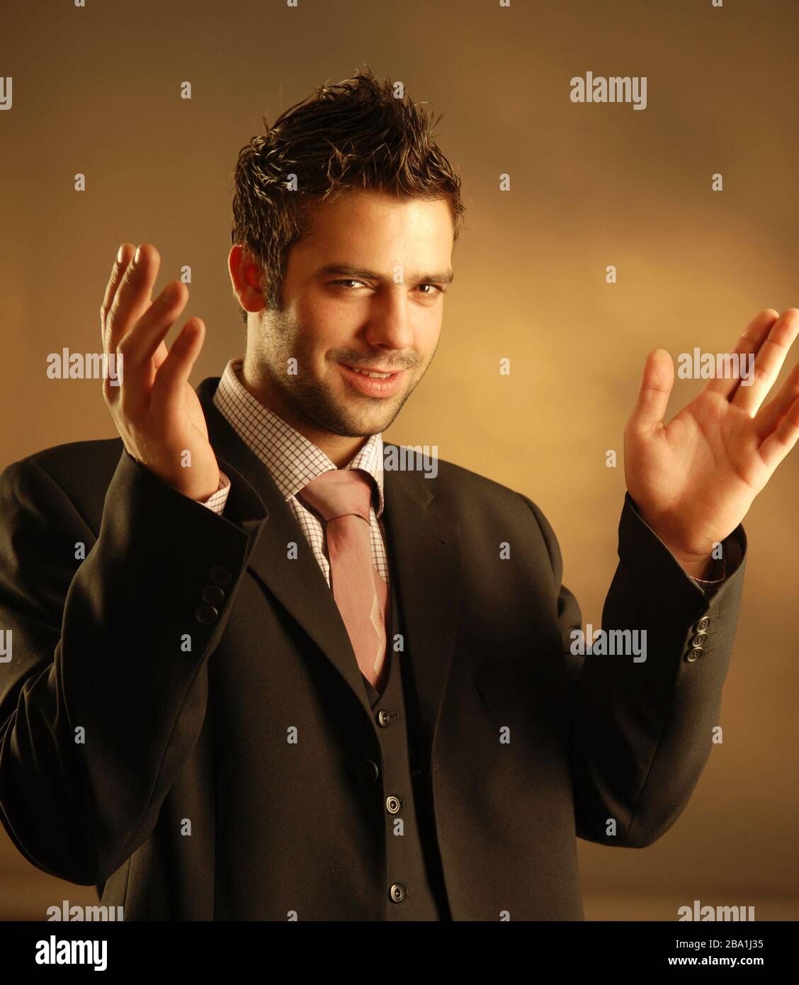 A young man doing a gesture Stock Photo - Alamy