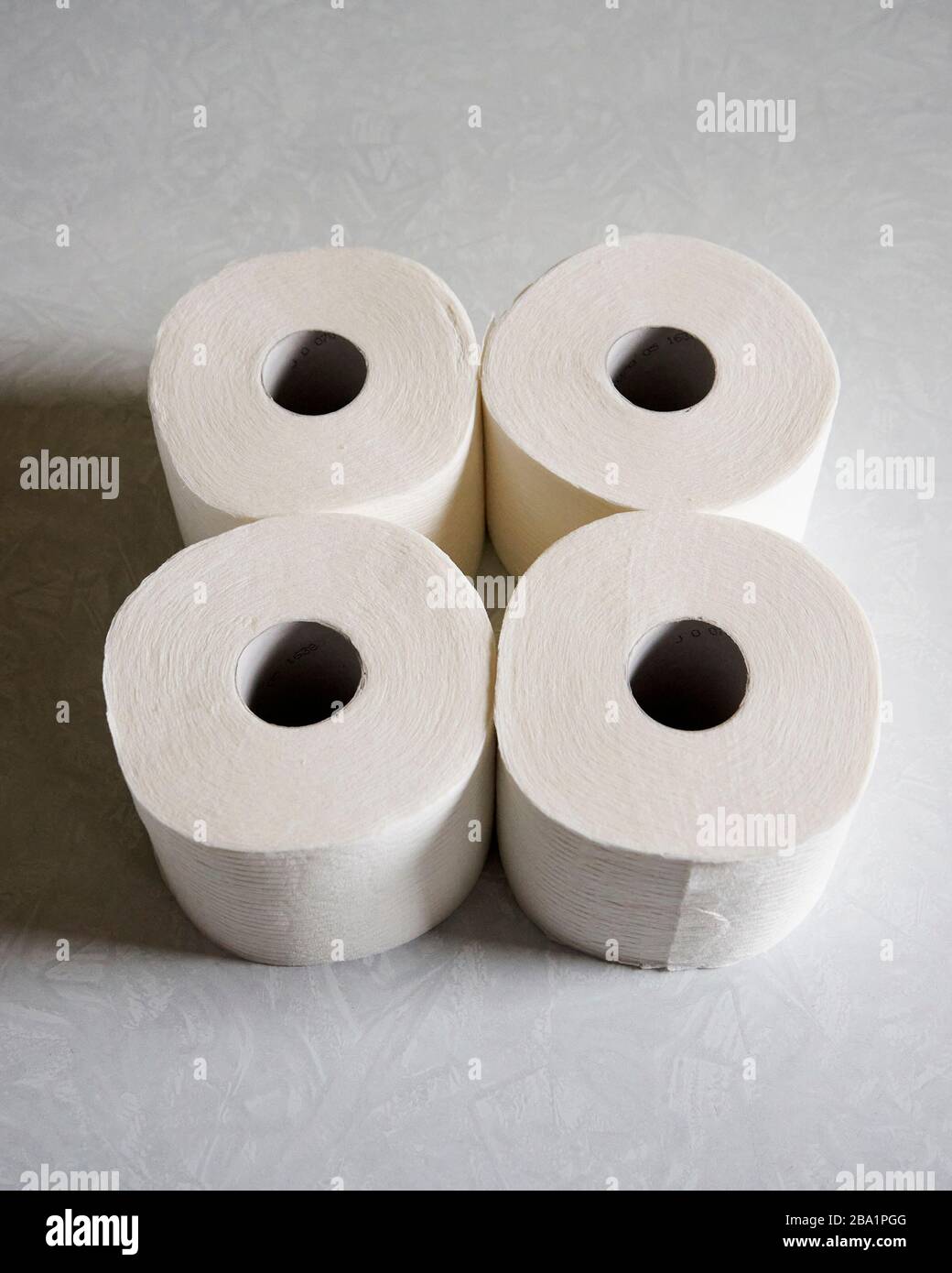 Rolls of white toilet paper Stock Photo - Alamy
