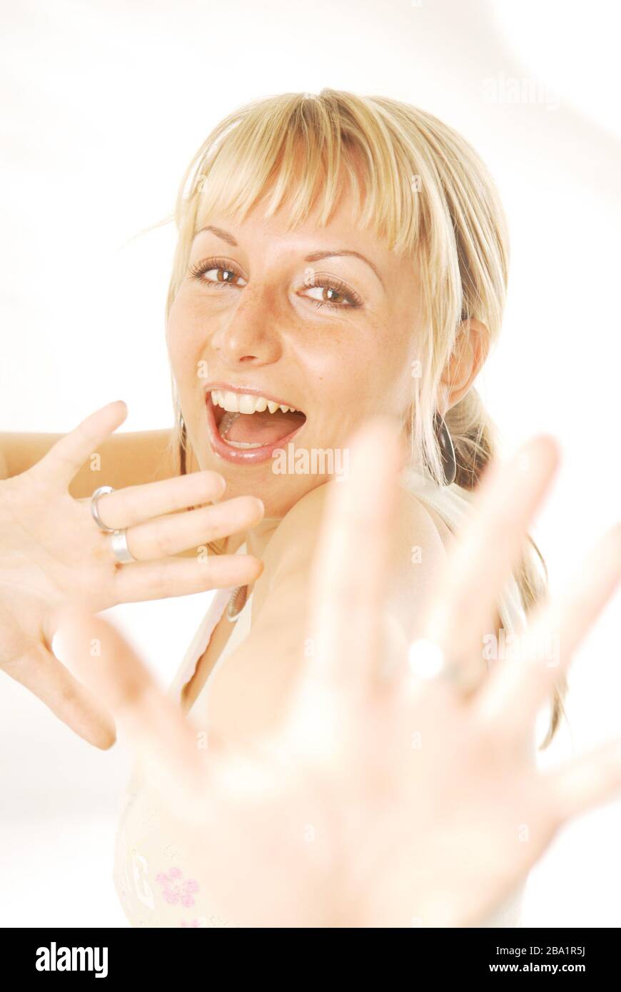 An young woman with refusal gesture Stock Photo - Alamy