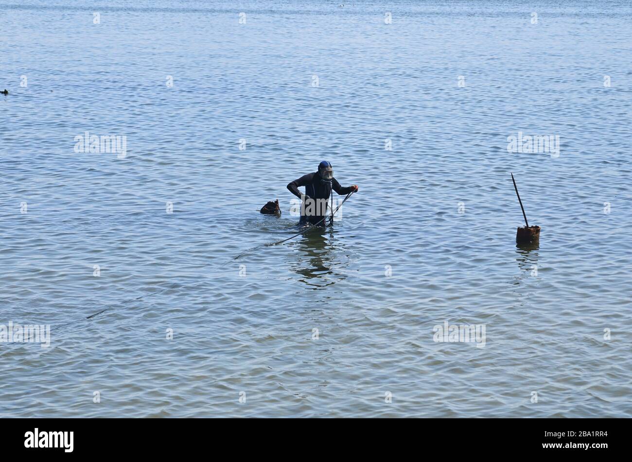 Repair work carried out by the sea Stock Photo - Alamy